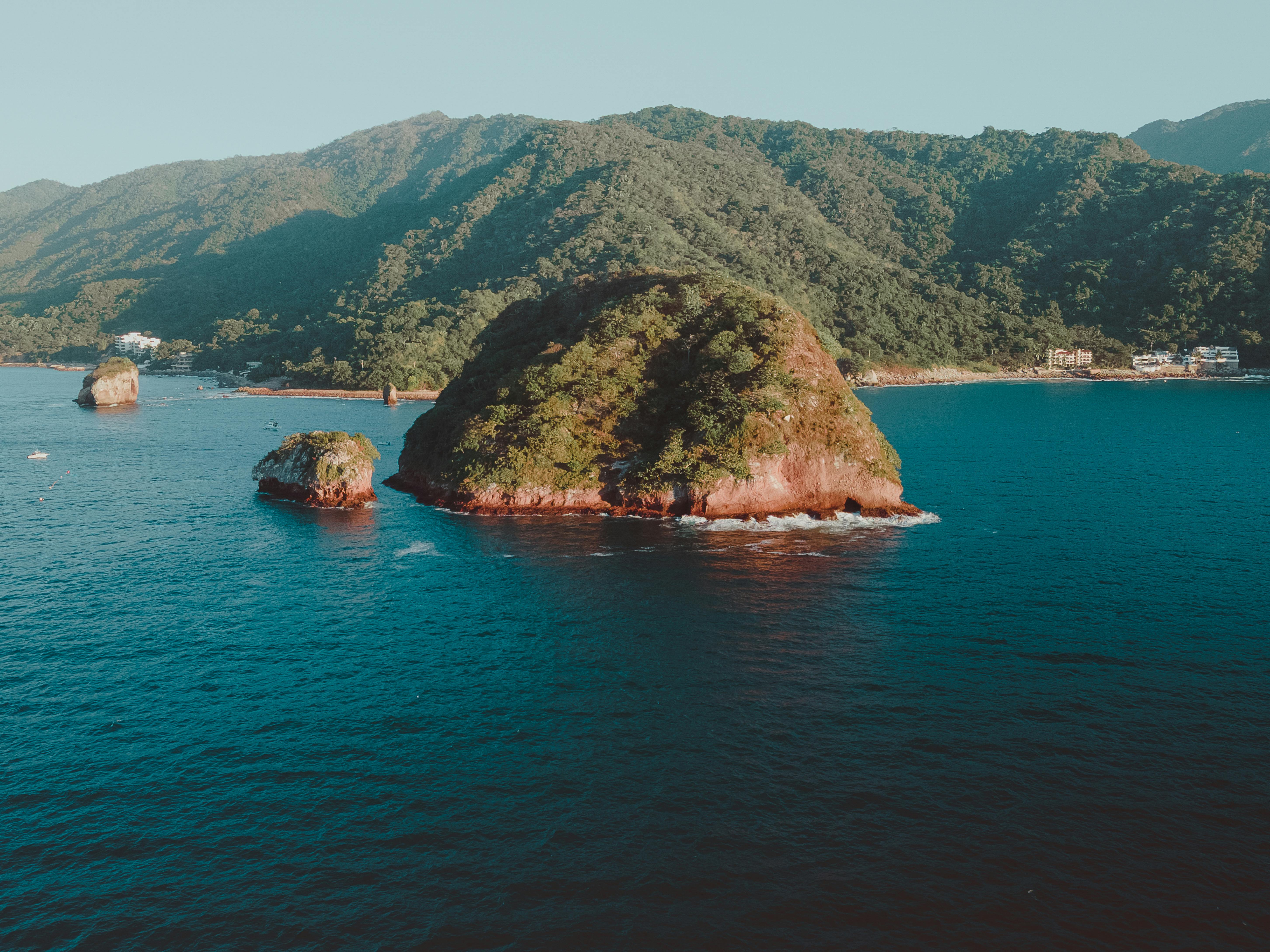 Islets Above the Sea Water · Free Stock Photo