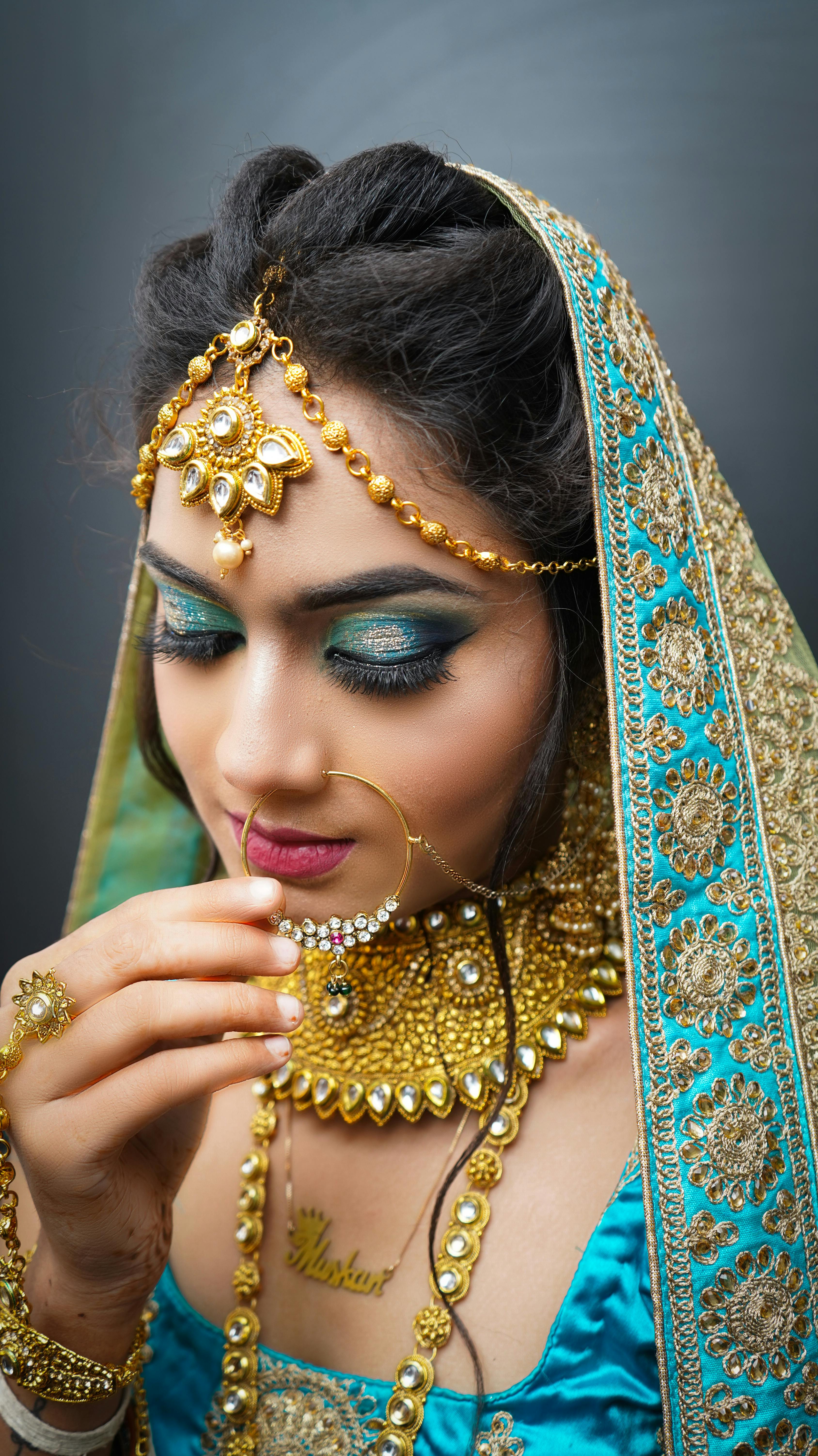 A Woman with a Golden Nath · Free Stock Photo