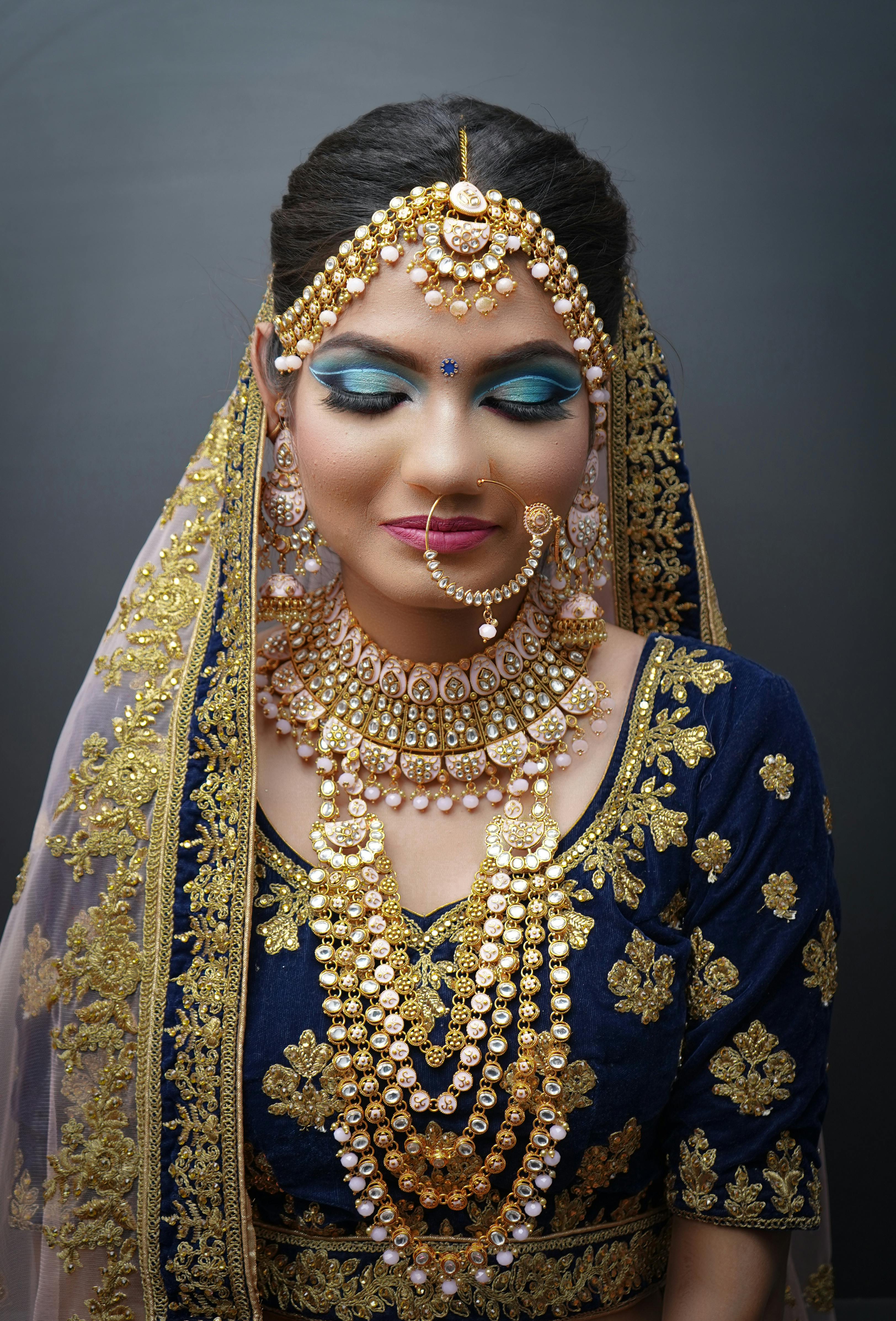 Woman in Blue and Gold Dress · Free Stock Photo