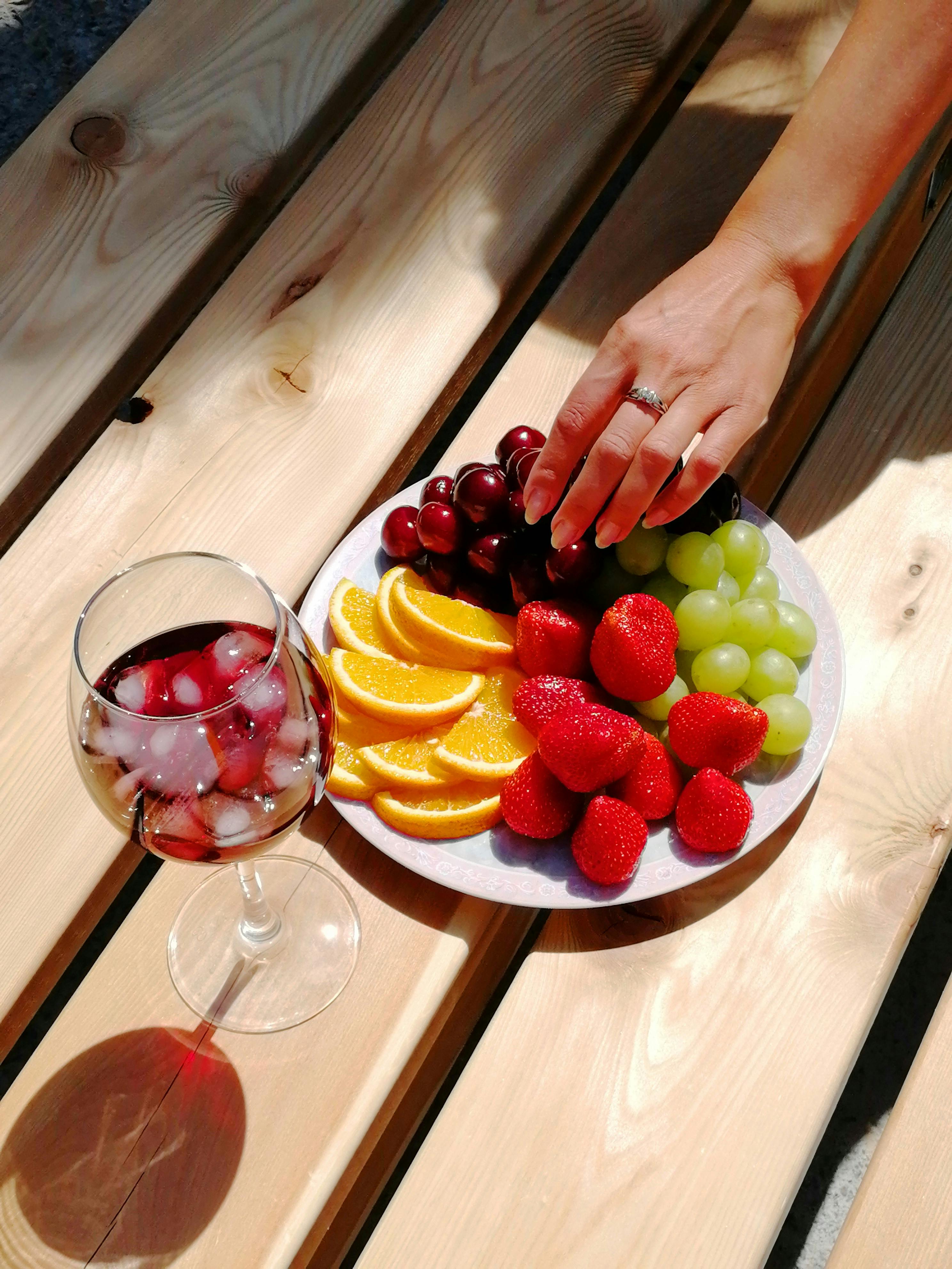 A Person Holding a Fruit · Free Stock Photo