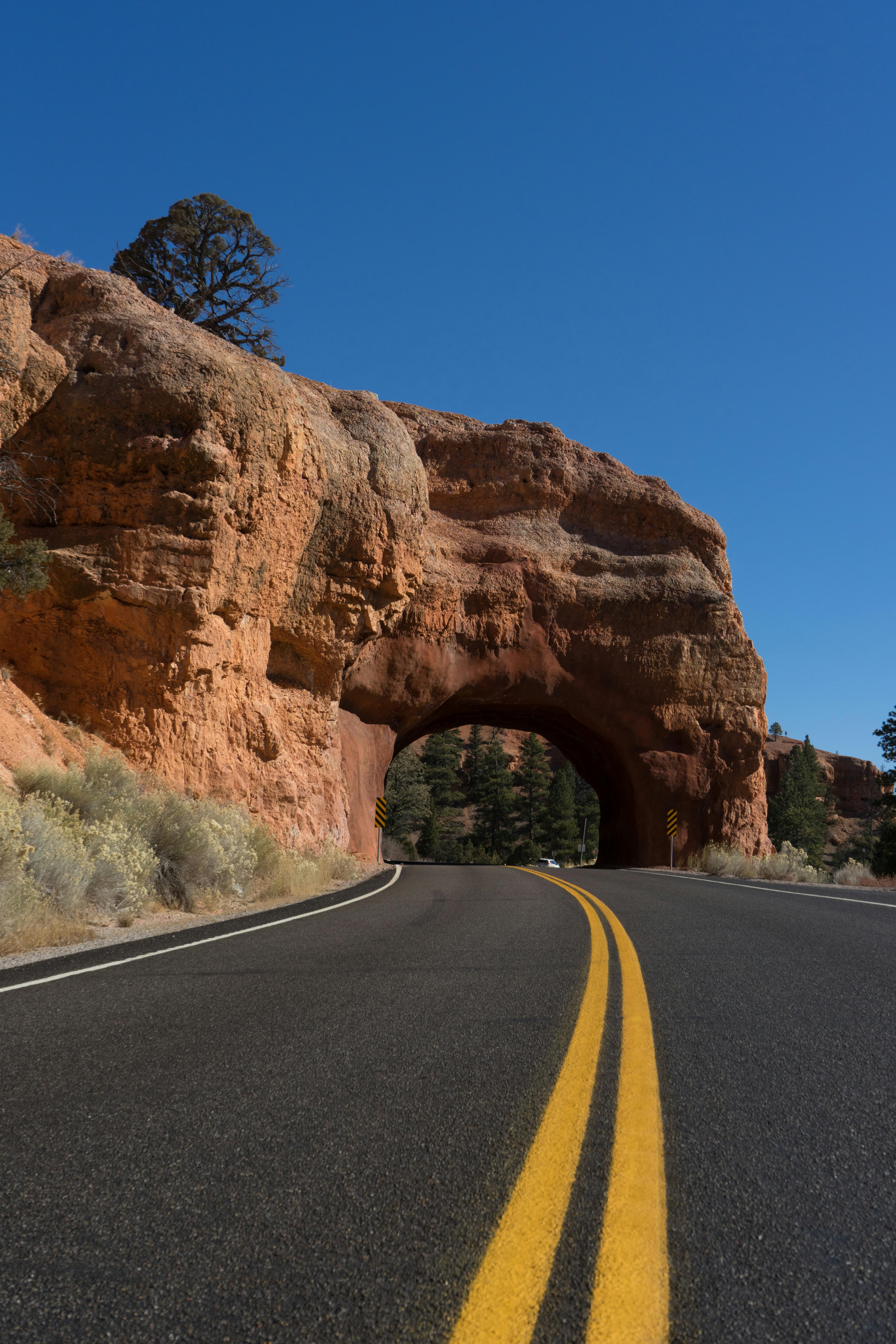 A Natural Arch Over a Road · Free Stock Photo