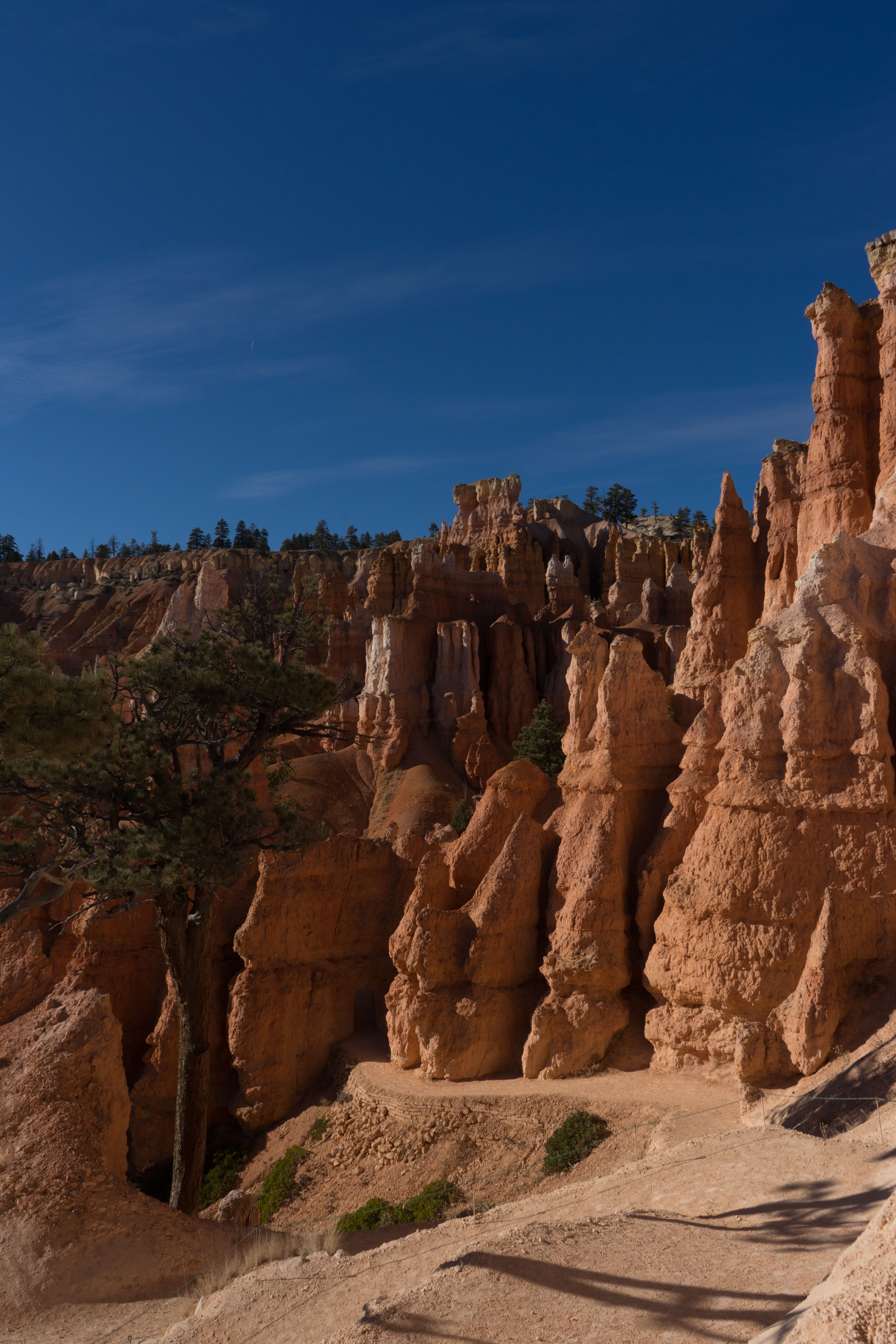 Brown Rock Formations Under White Clouds · Free Stock Photo