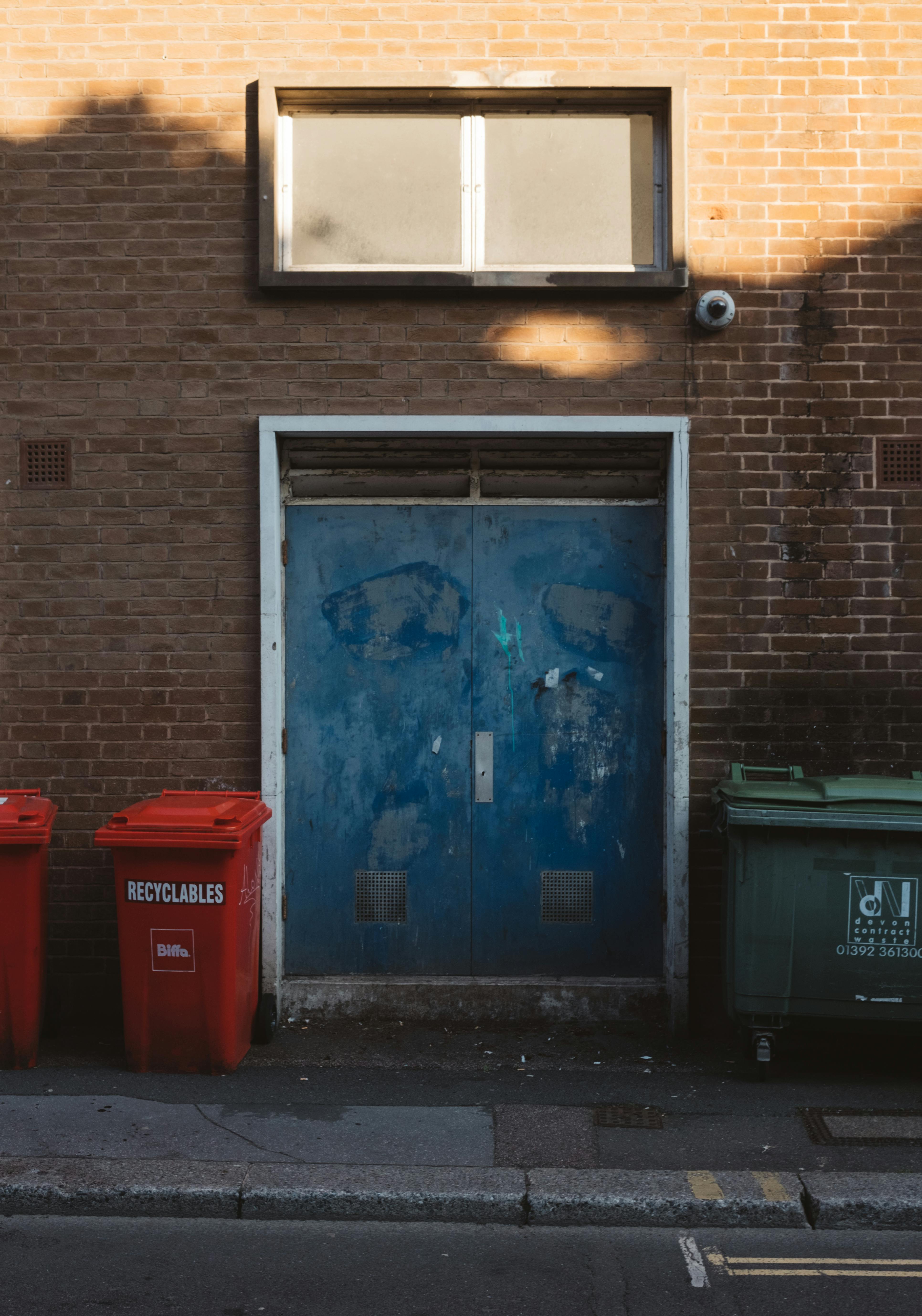 Garbage Bin Lying Down near Stairs · Free Stock Photo