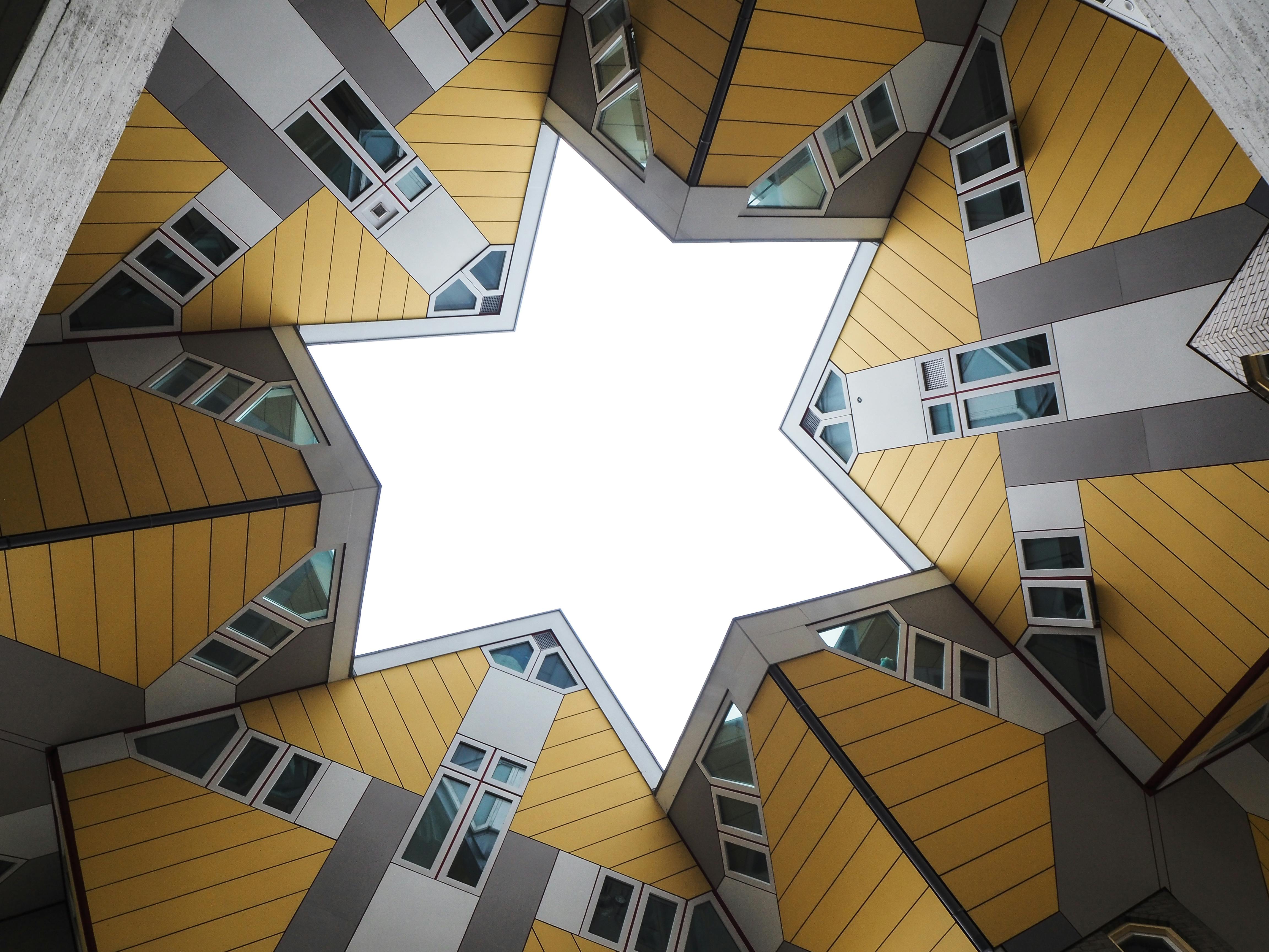 Low angle shot of a Geometrically Shaped Building · Free Stock Photo