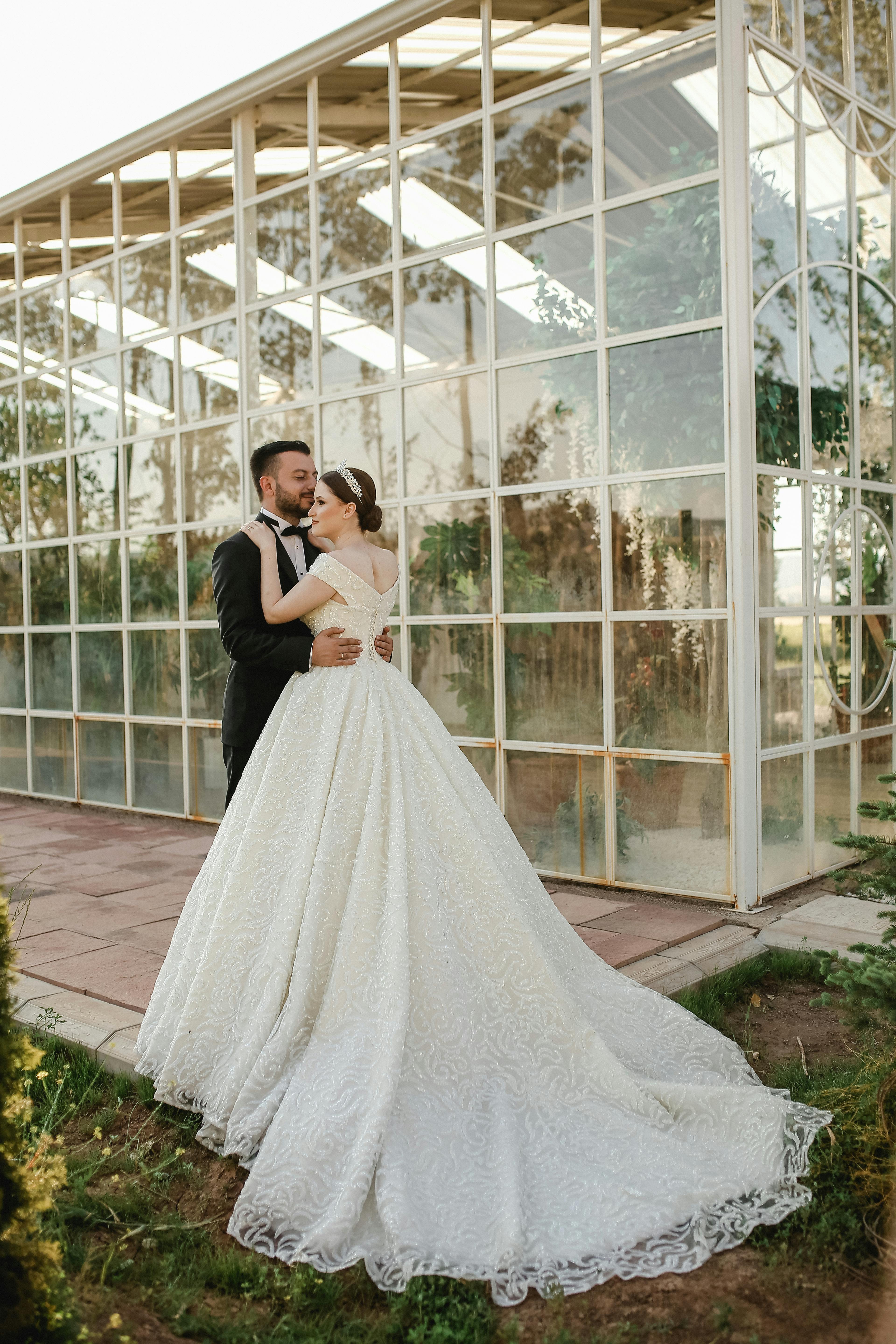 Happy Bride Posing at Outdoor Terrace · Free Stock Photo
