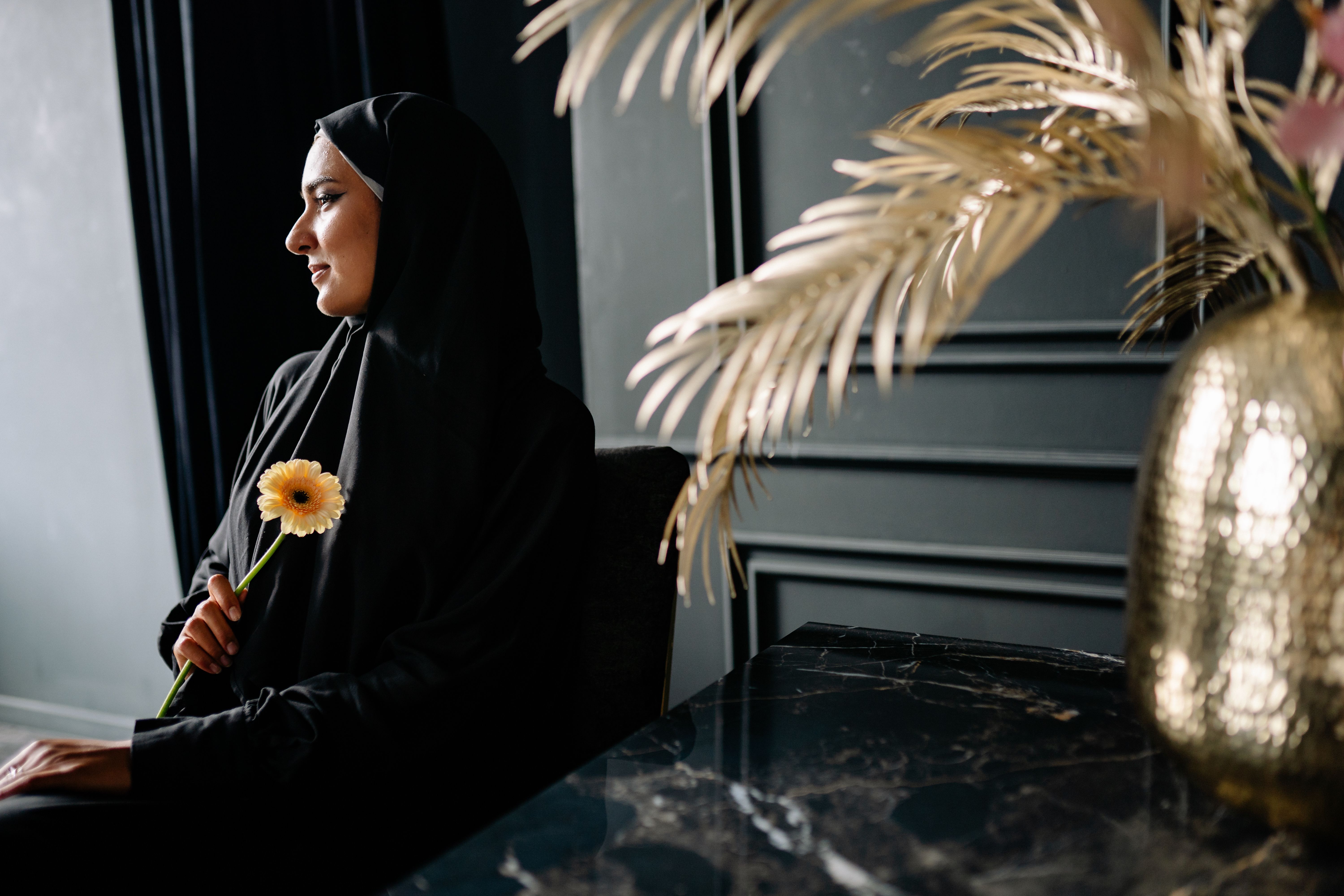 Woman in Black Hijab with Metal Facemask · Free Stock Photo