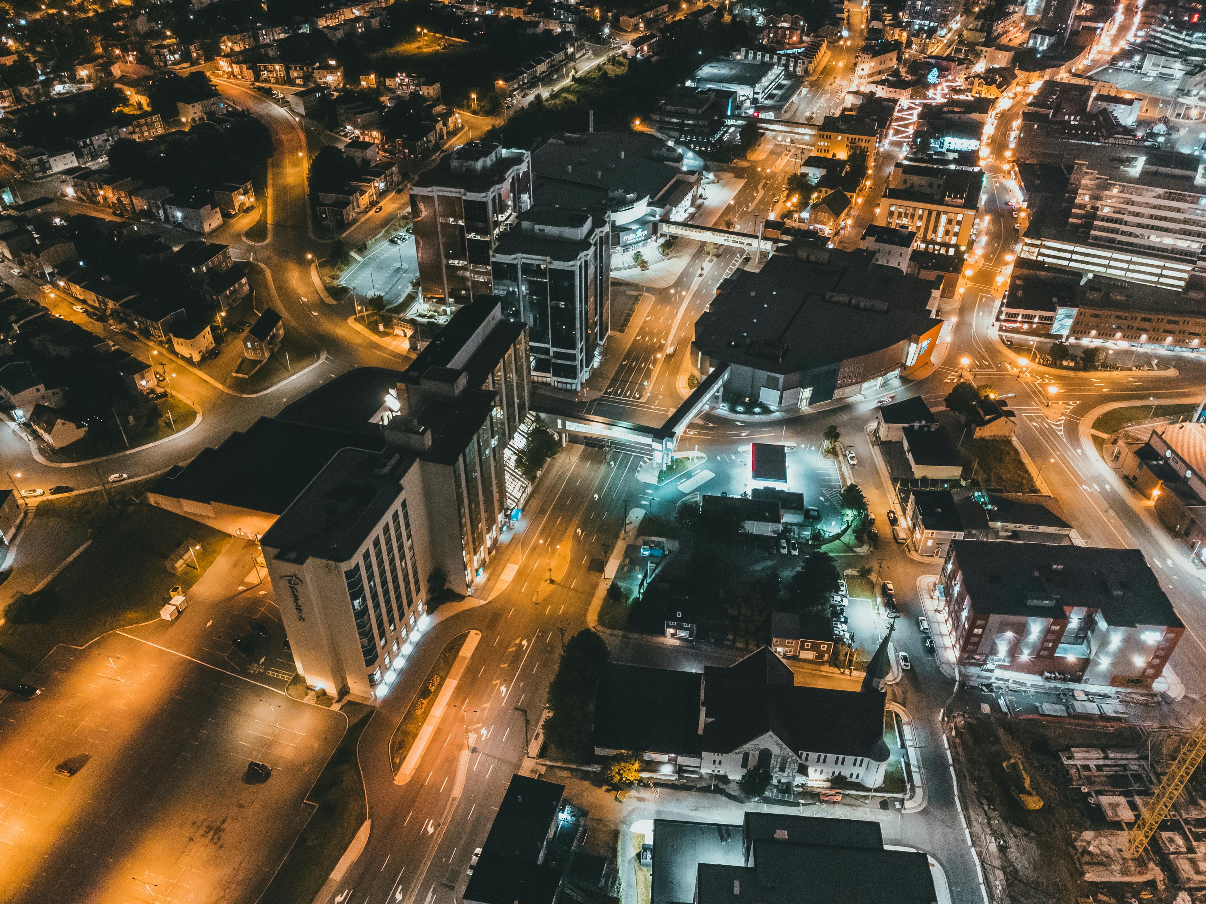 Man in Black Jacket Standing on Edge of Building · Free Stock Photo