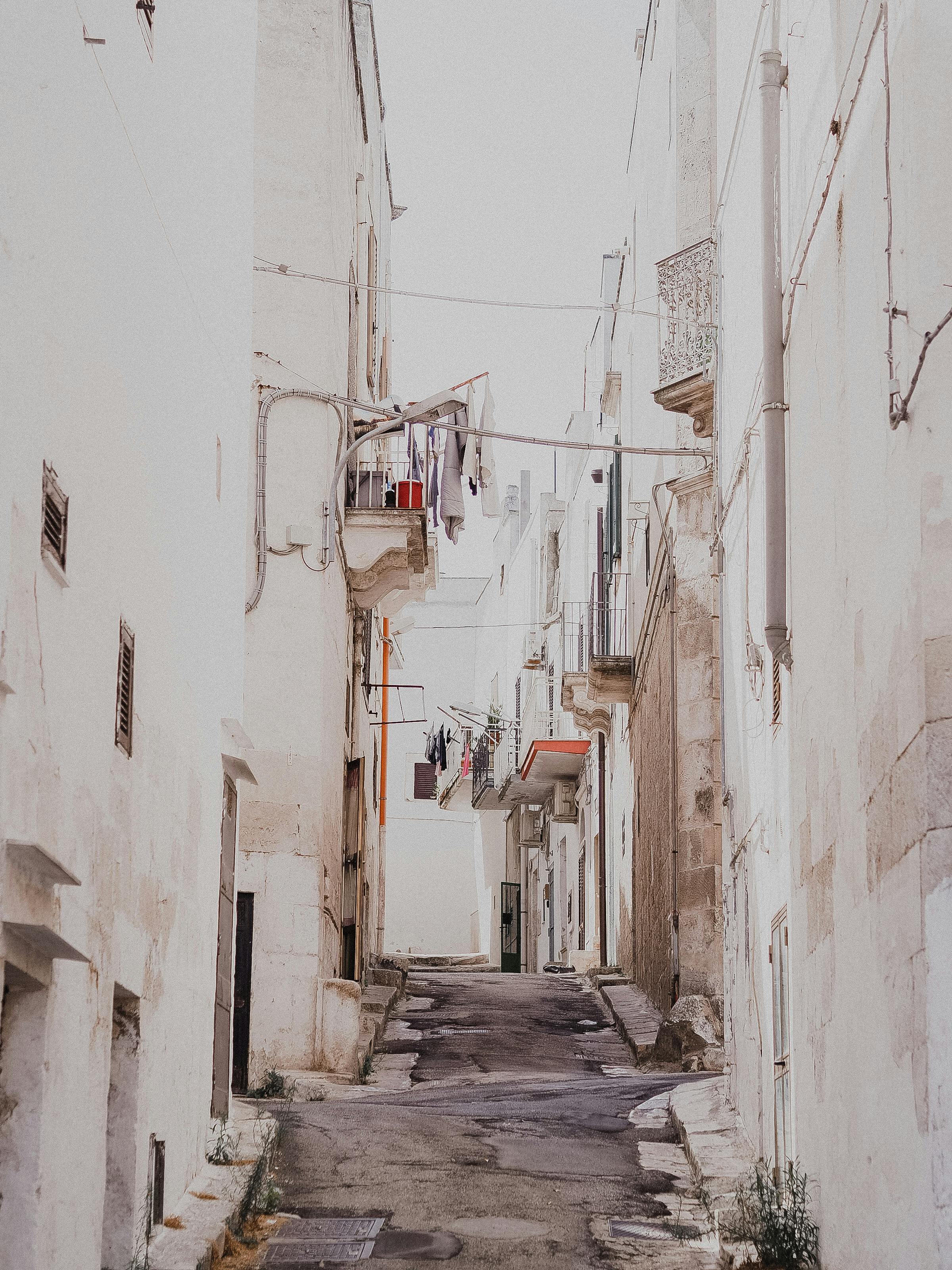 Low-Angle Shot of Alleyway between Two Buildings · Free Stock Photo