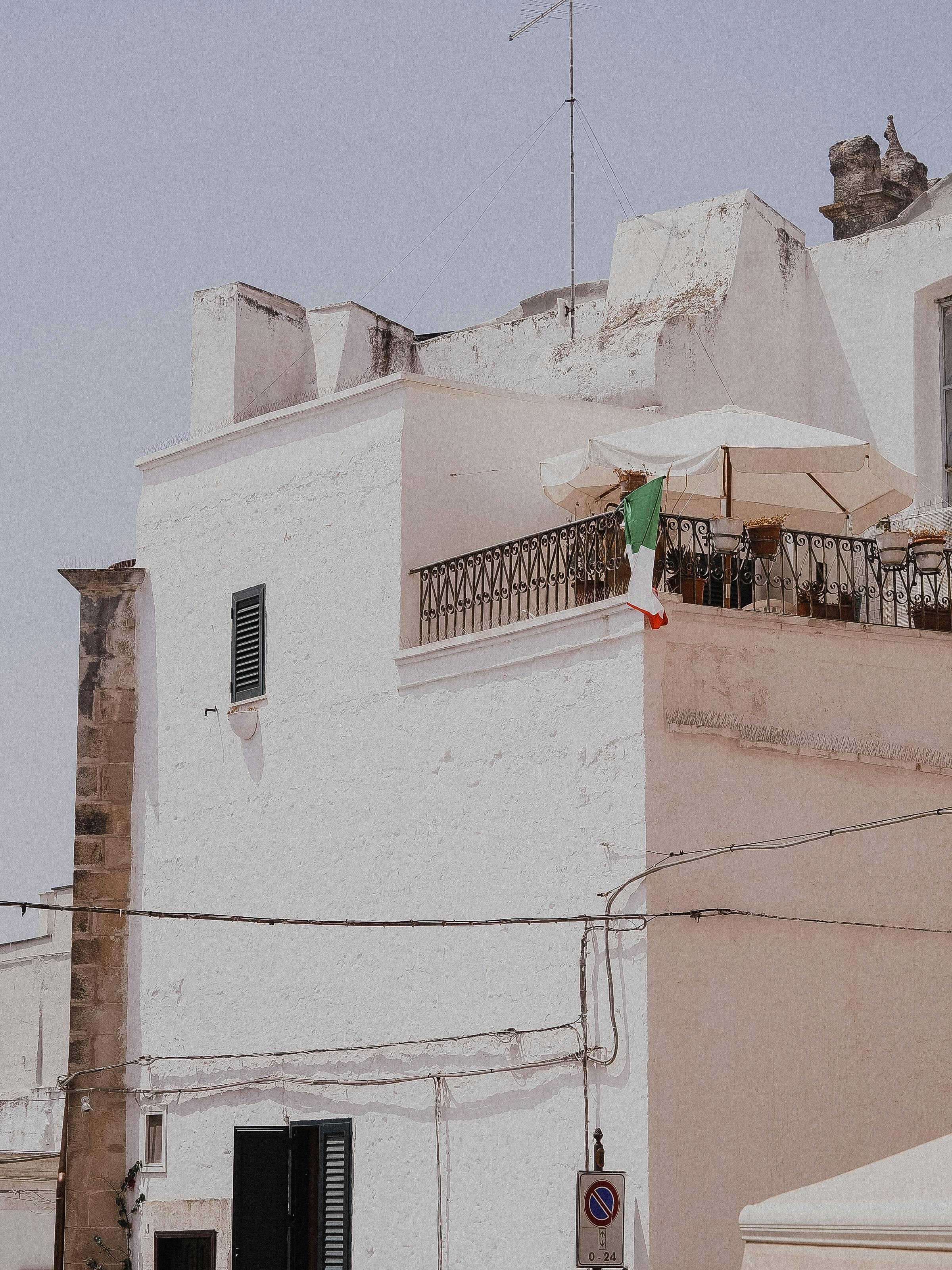 Traditional White Building on Sky Background · Free Stock Photo