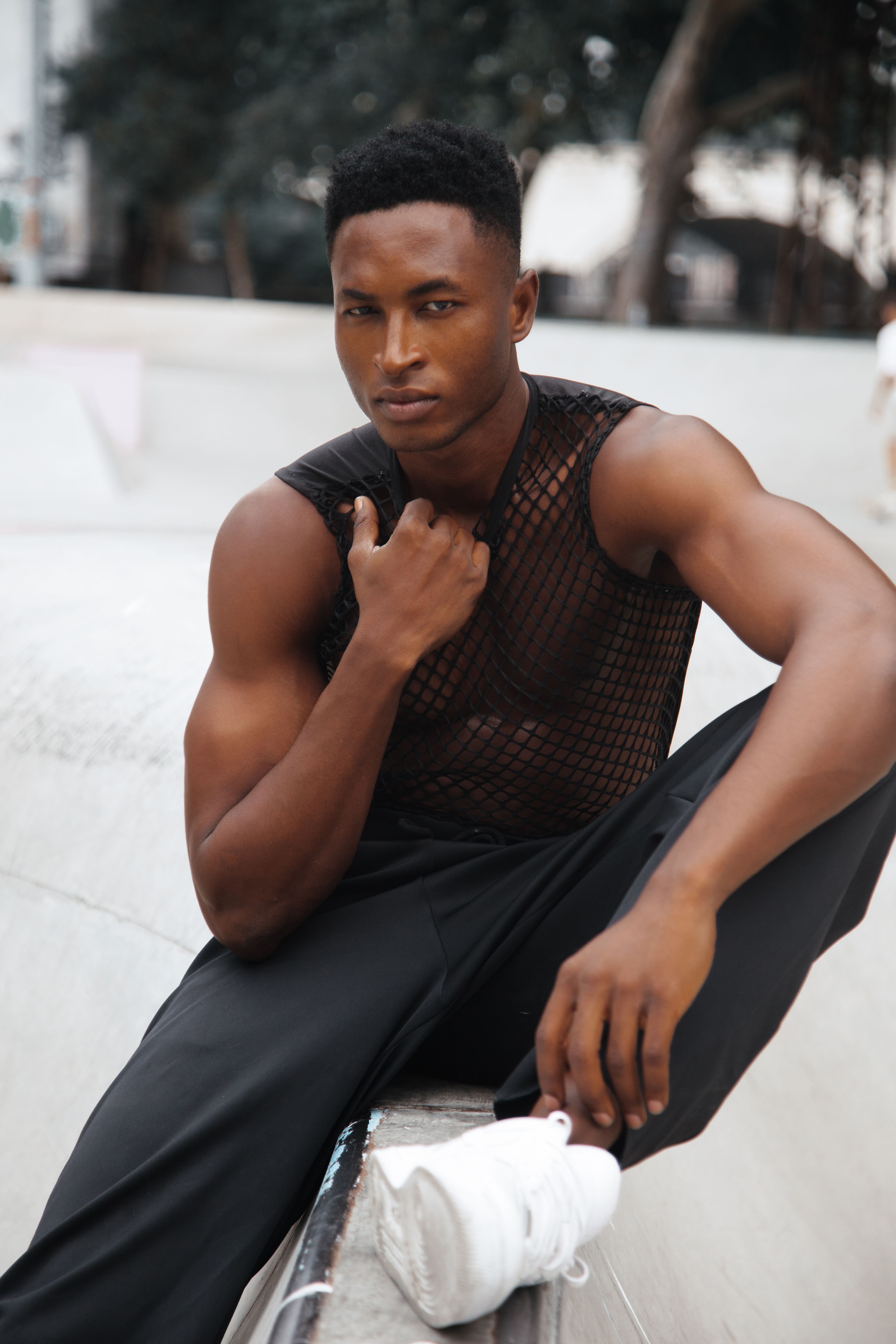 Man In Black Muscle Shirt and Black Pants · Free Stock Photo