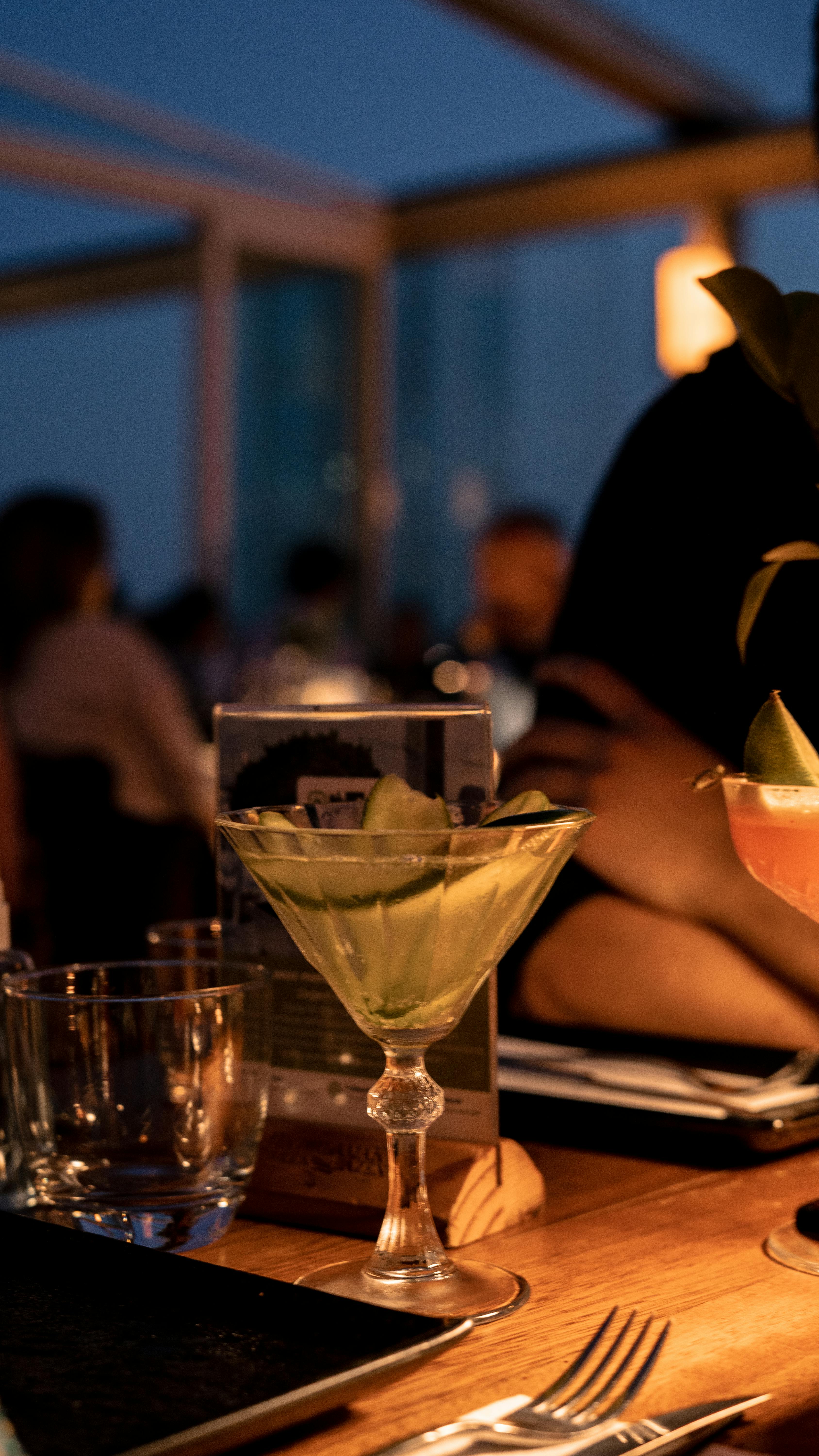 Close-Up Shot of a Cocktail Drink on Wooden Surface · Free Stock Photo