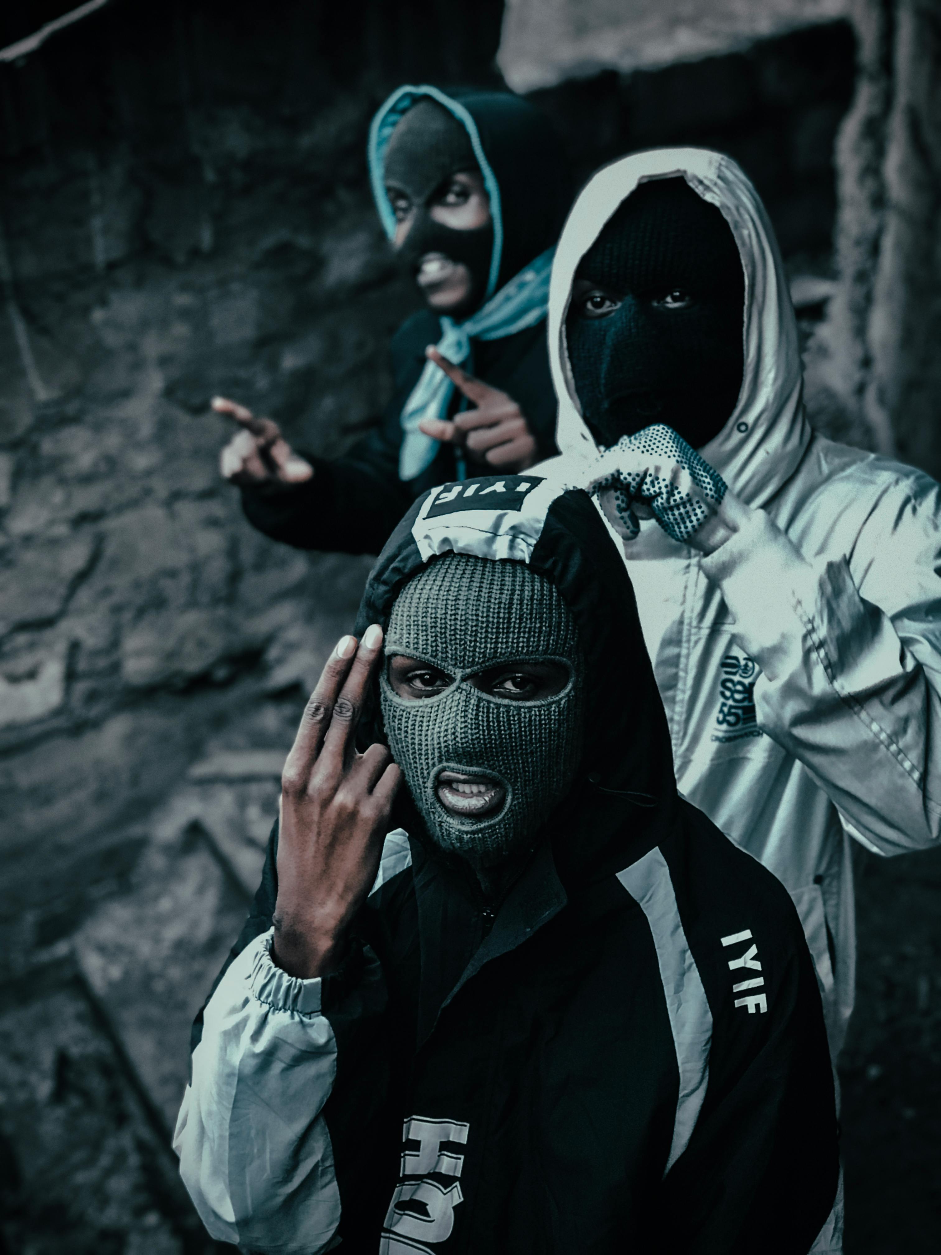Three Man Wearing Masks · Free Stock Photo