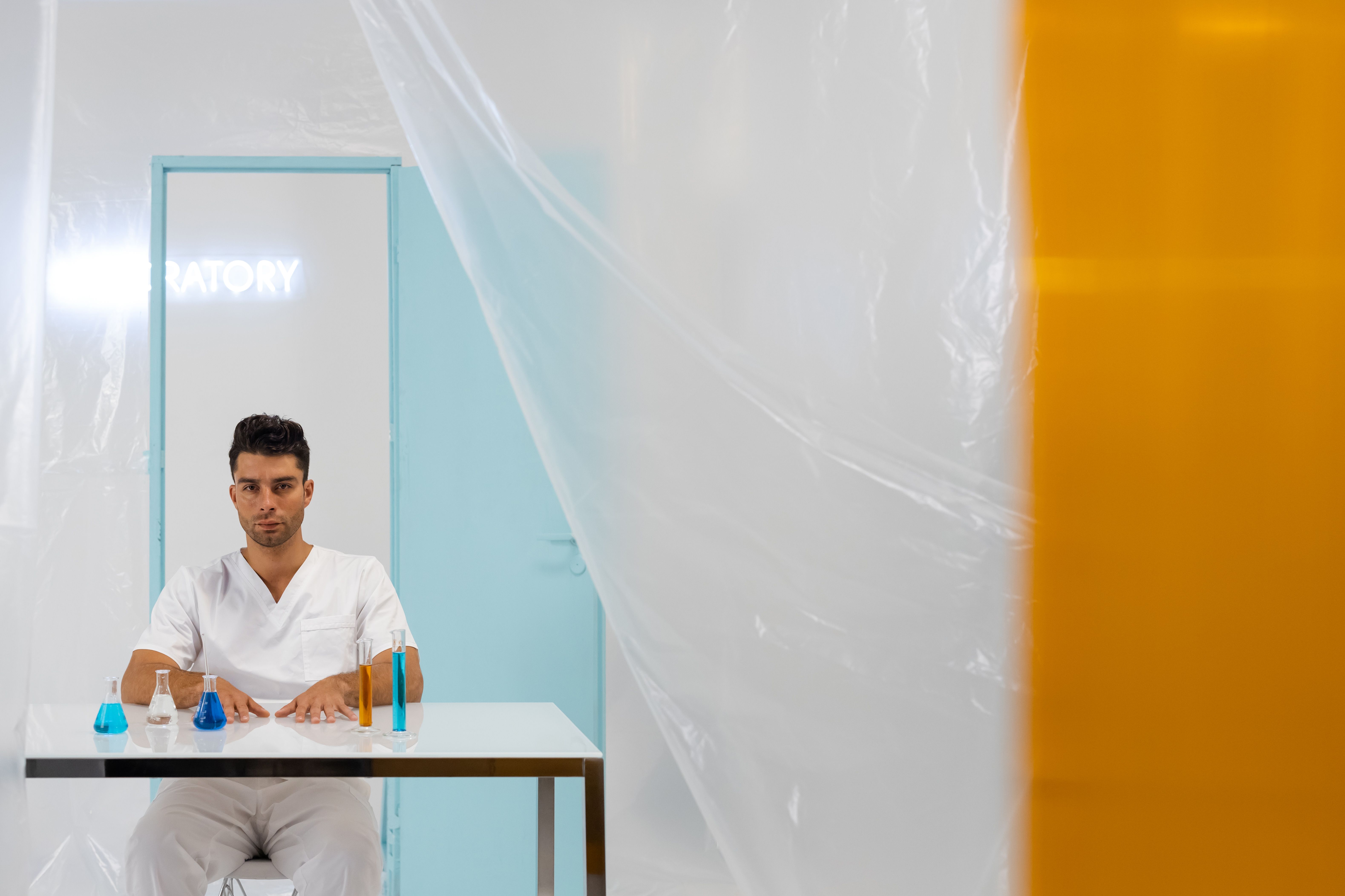 Person in White Scrub Suit · Free Stock Photo