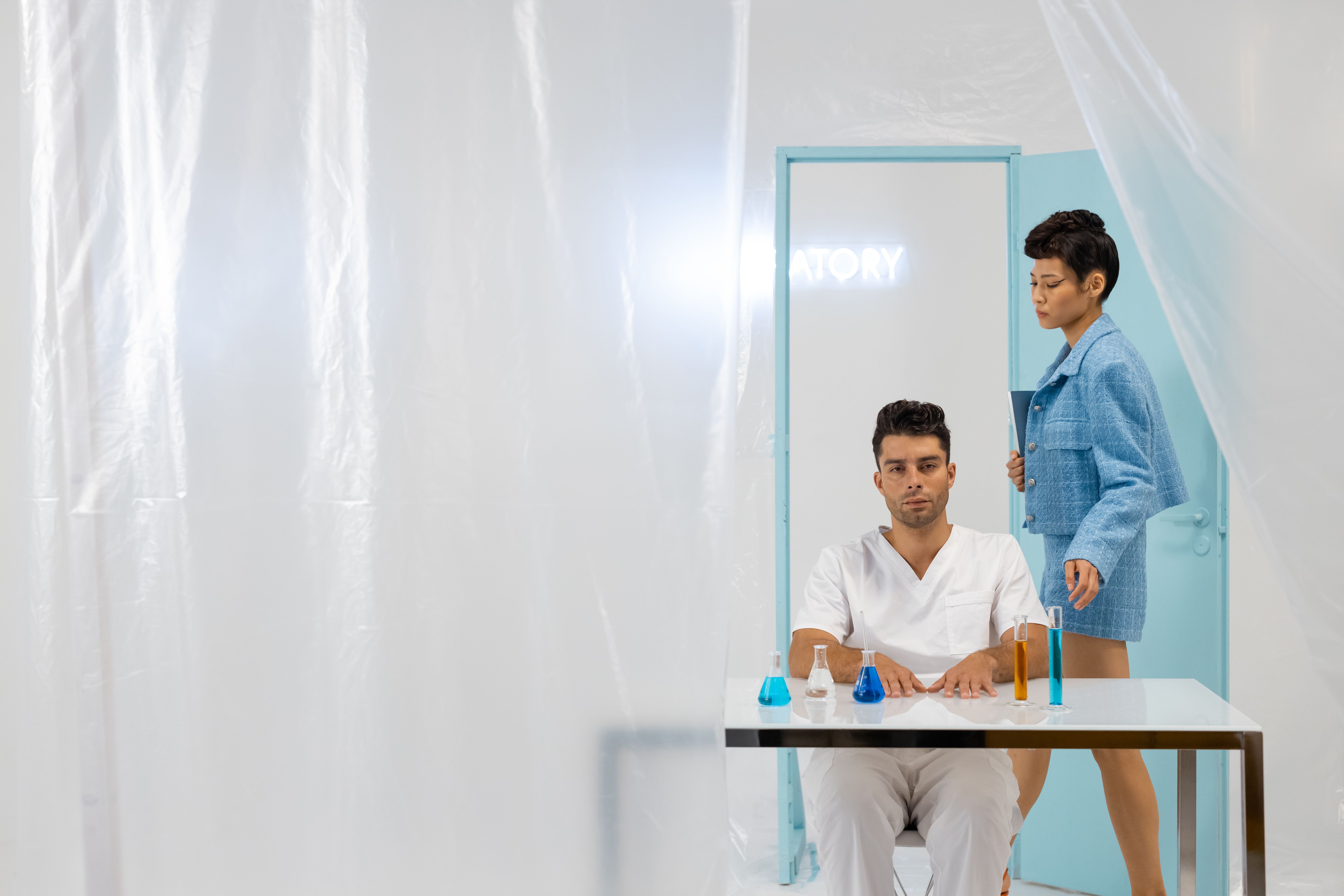 Man Sitting Behind a Table · Free Stock Photo