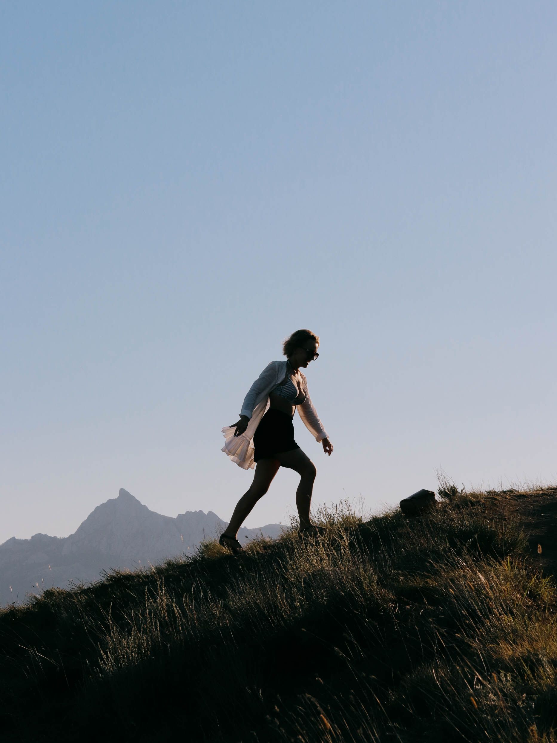 Woman Walking Up the Hill · Free Stock Photo