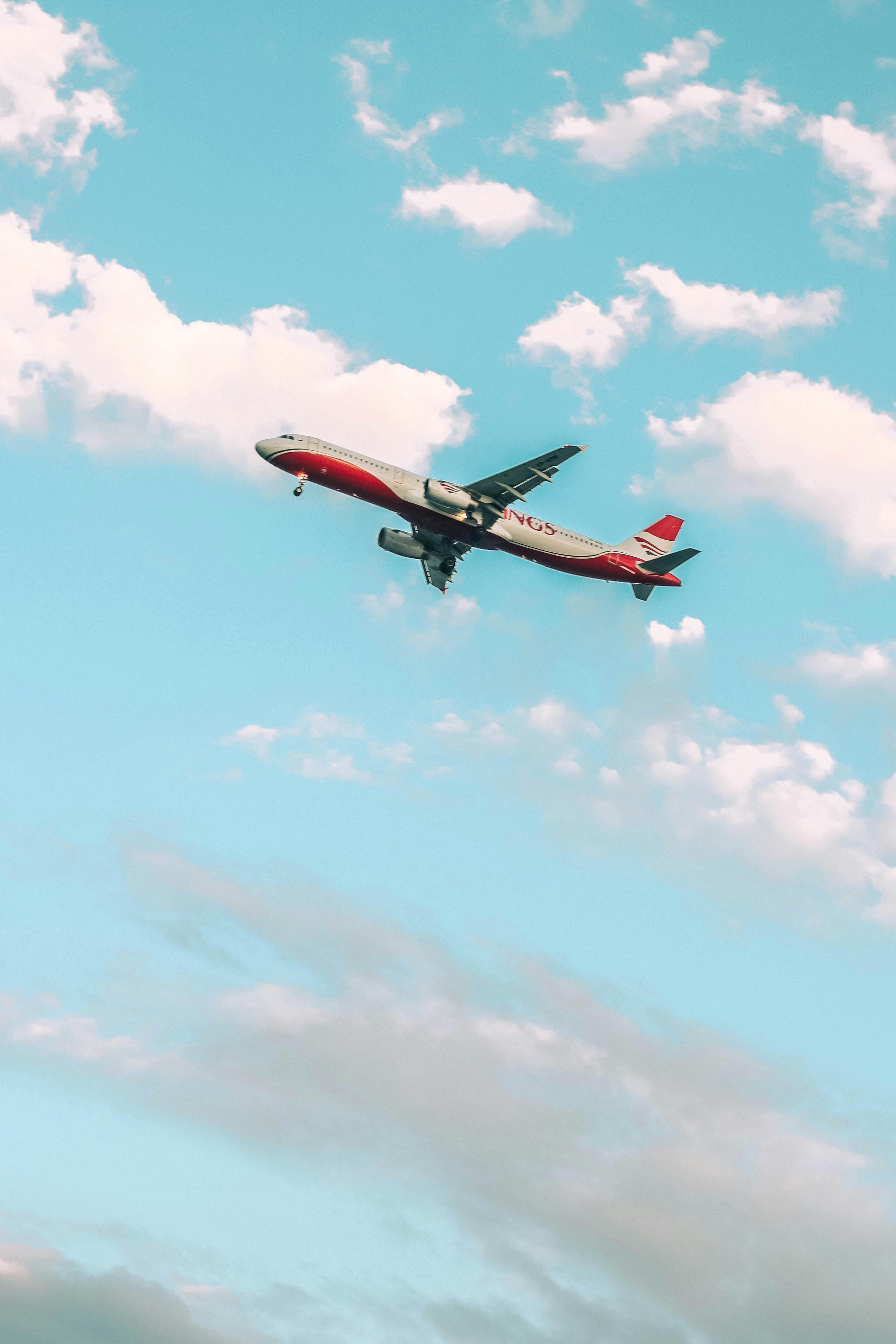 Wing of Flying Airplane · Free Stock Photo