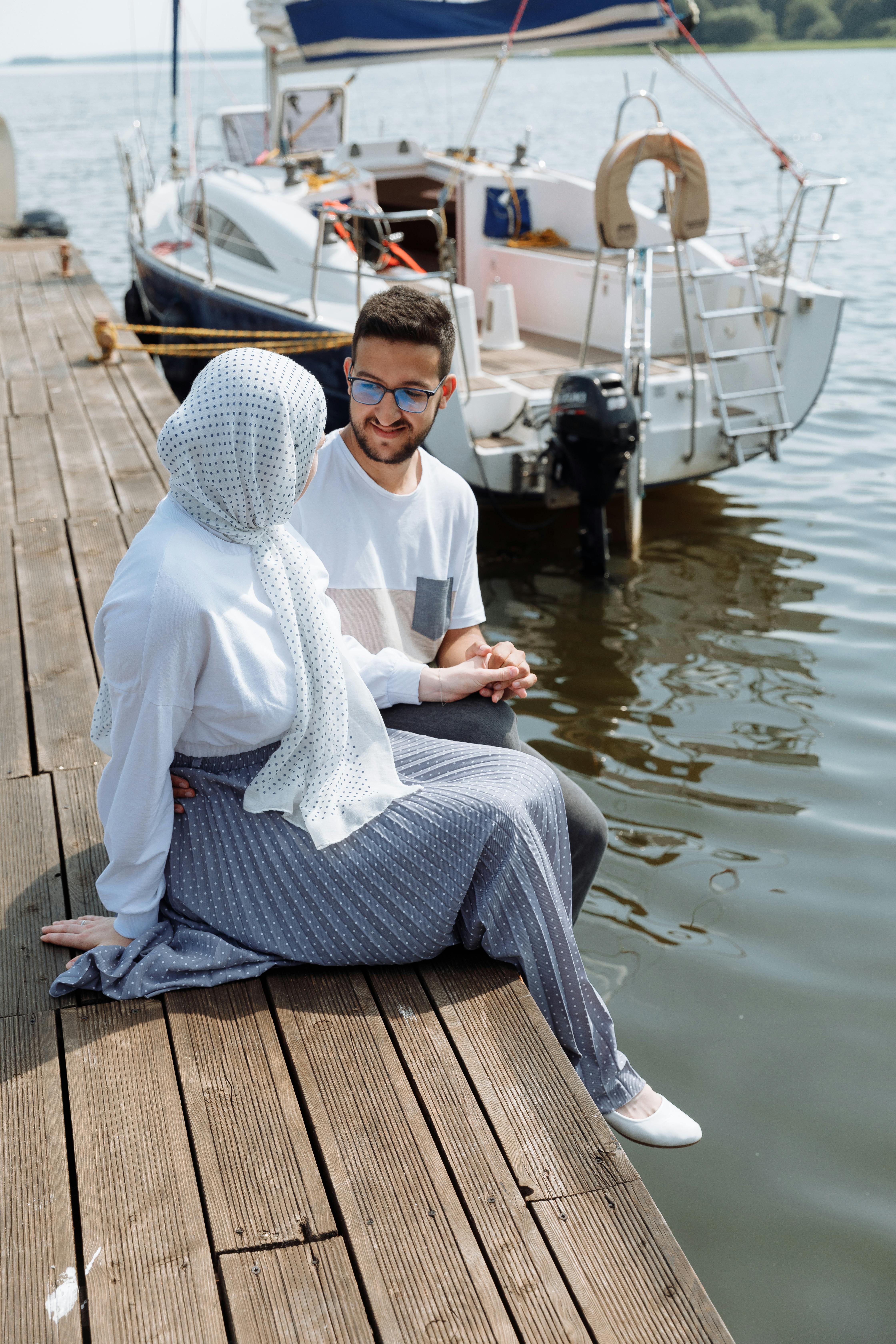Muslim Couple Looking at City From a Terrace · Free Stock Photo