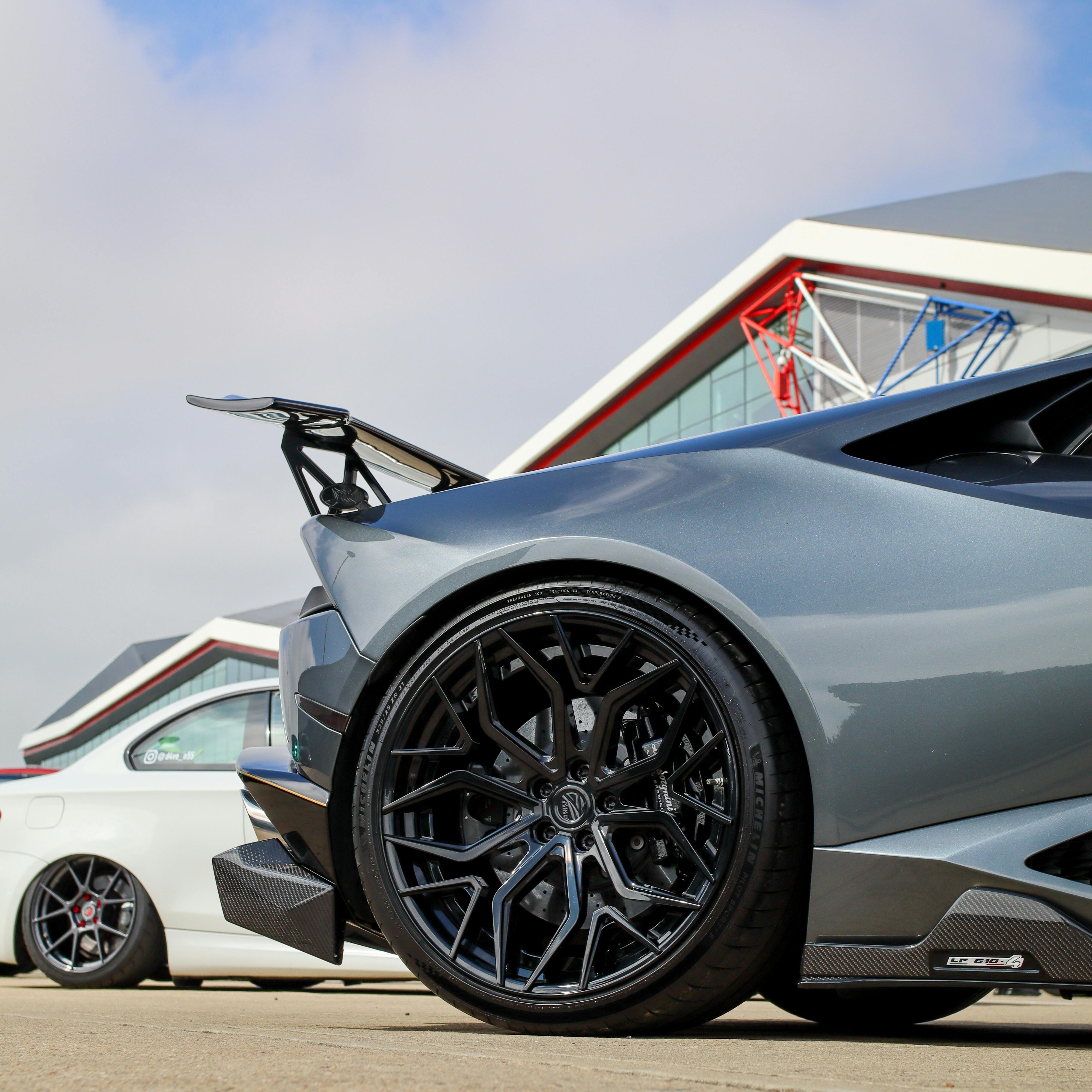 A Silver Racing Car with Black Rim · Free Stock Photo