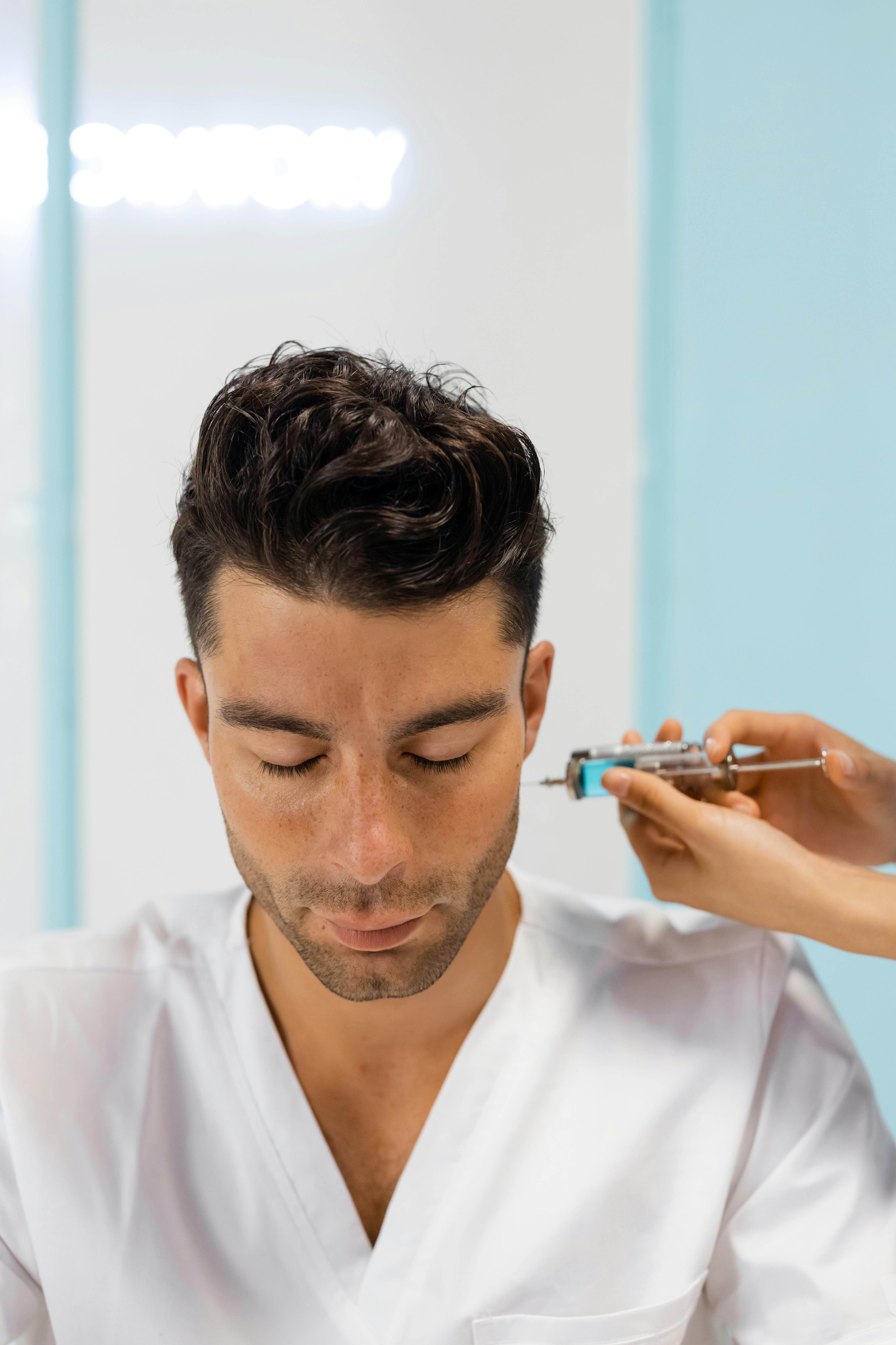 Man Getting Vaccinated · Free Stock Photo
