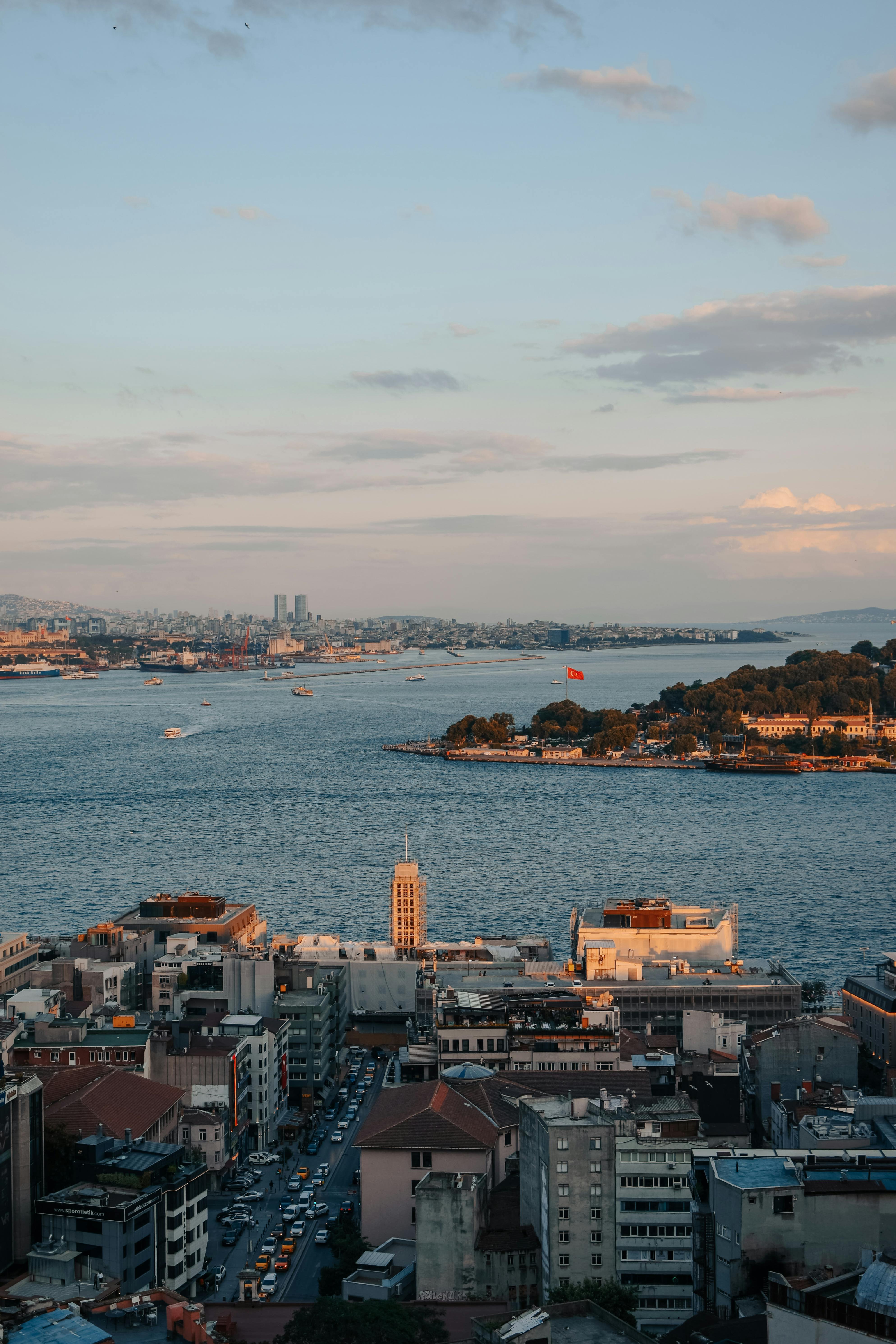 Aerial View of City Buildings Near Sea · Free Stock Photo