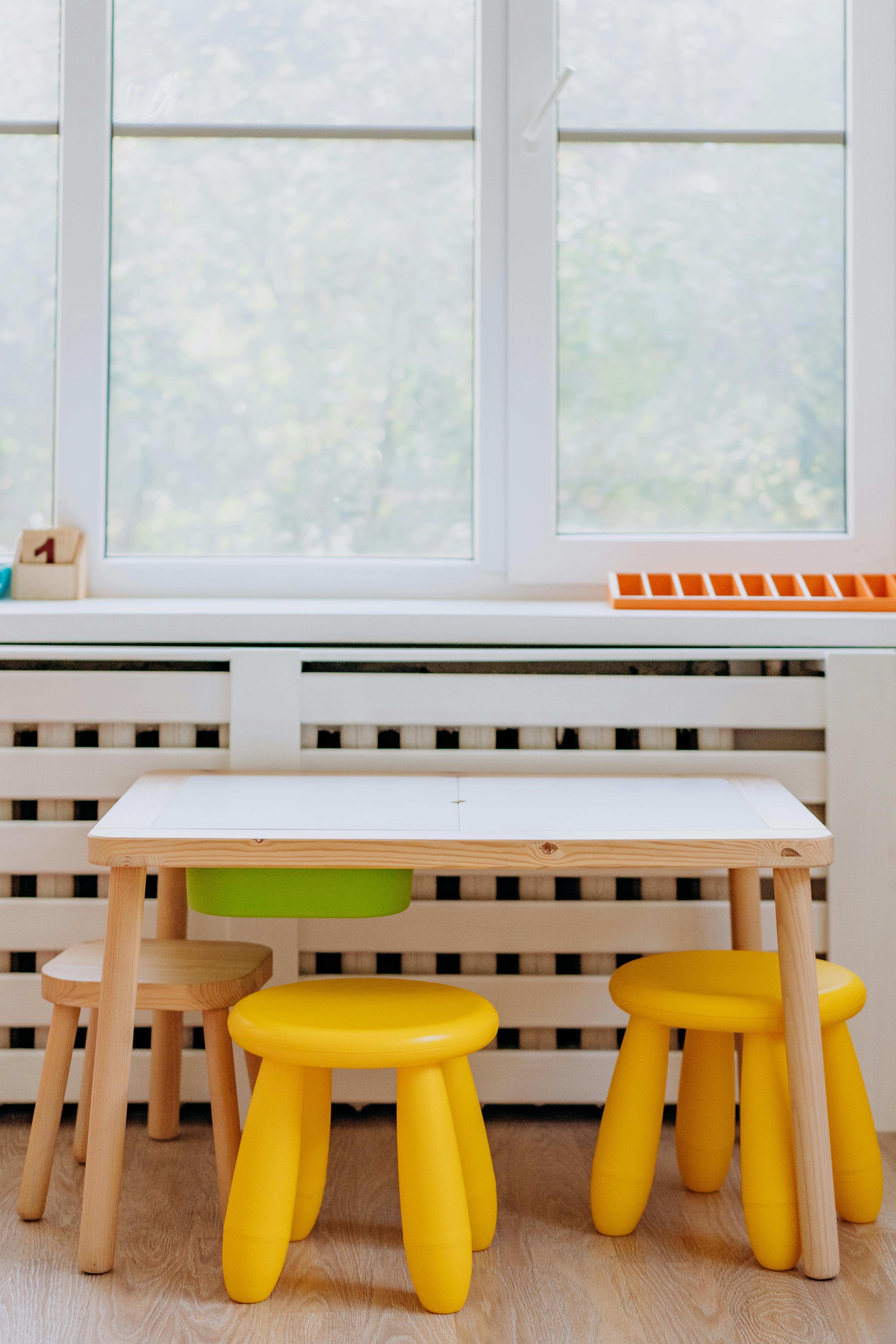 Wooden Table and Cabinet Near the Glass Window · Free Stock Photo