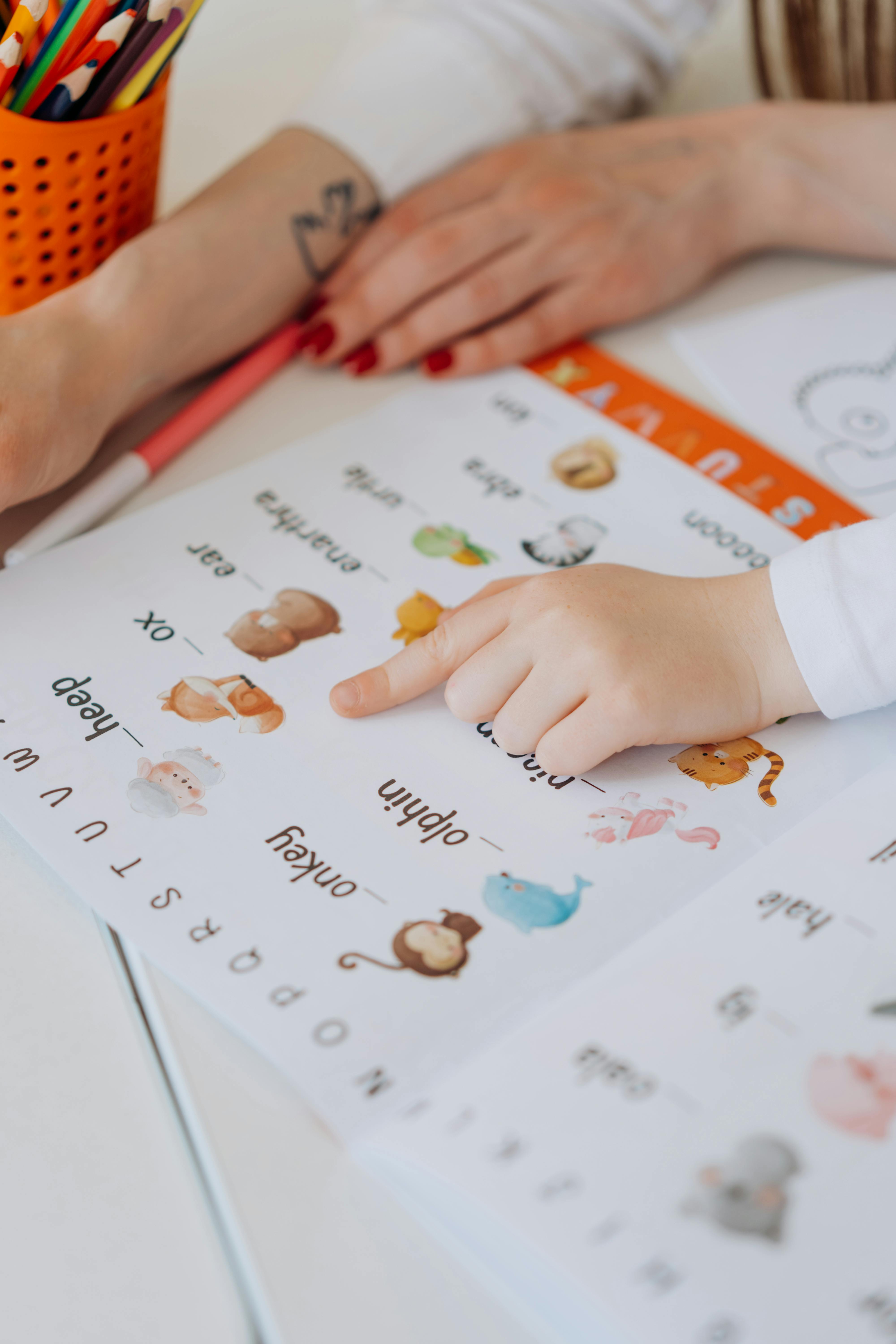 Child Reading English Alphabet · Free Stock Photo