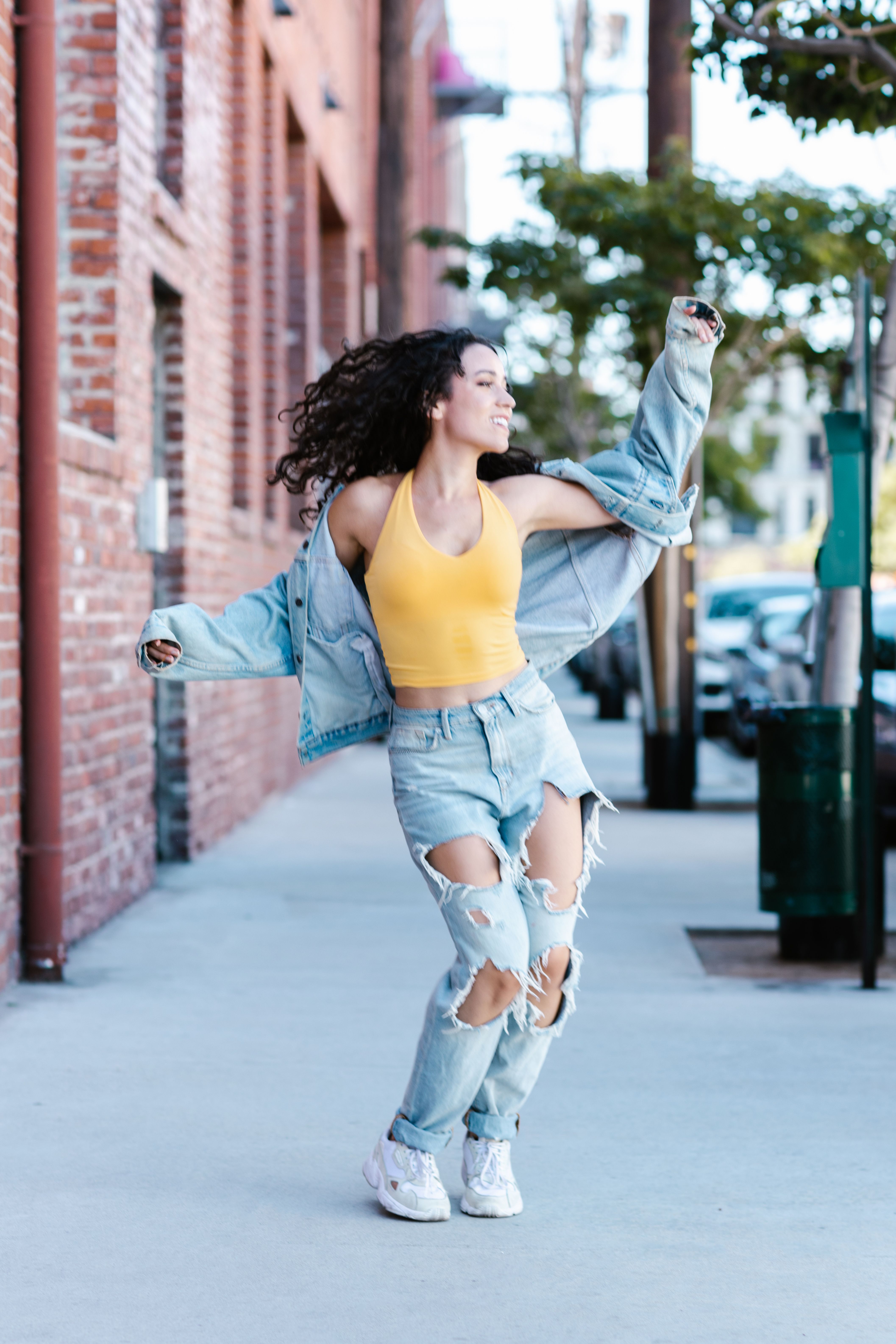 Woman Doing Dance Moves on the Hallway · Free Stock Photo