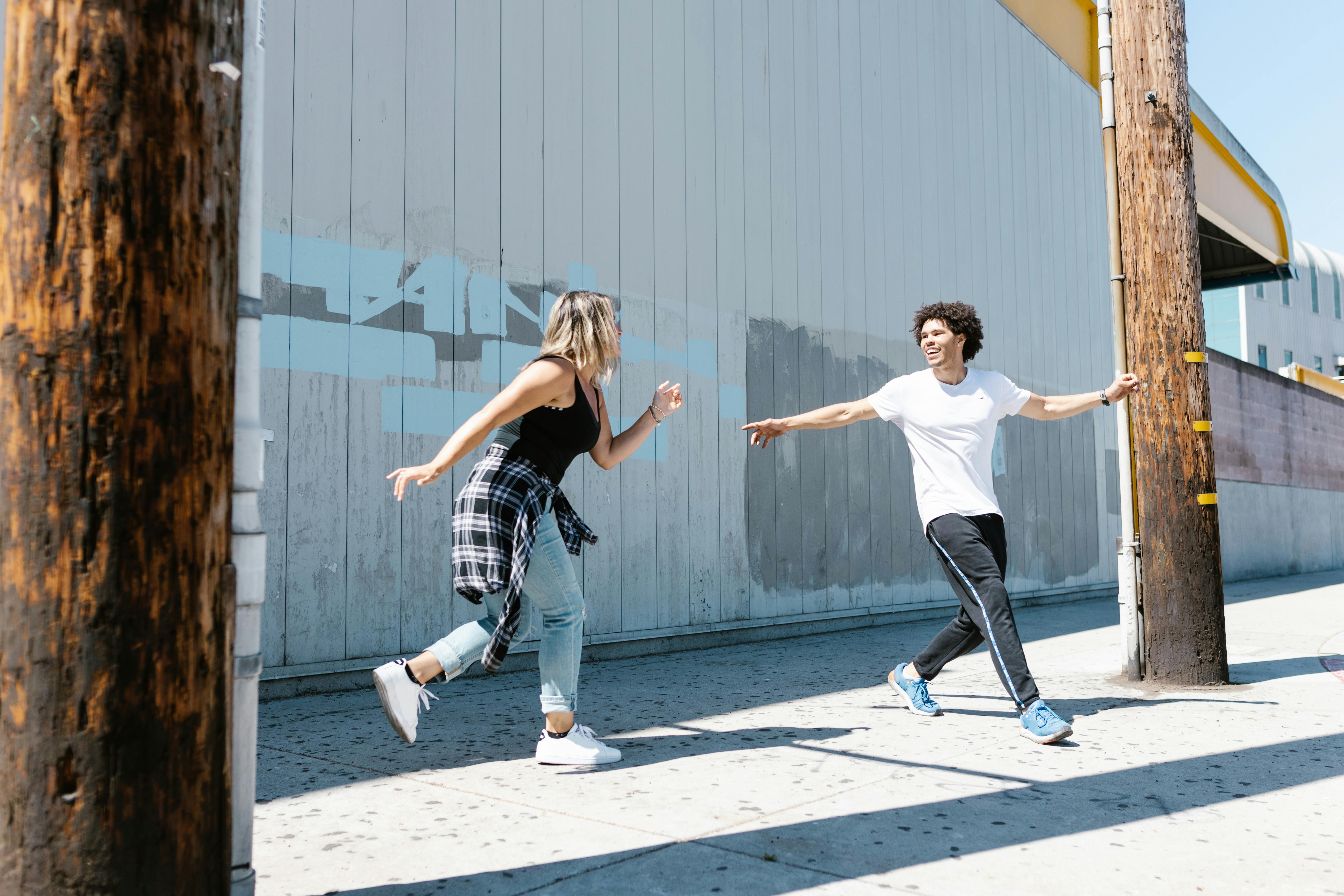 Photo of a Man and a Woman Dancing while Looking at Each Other · Free ...