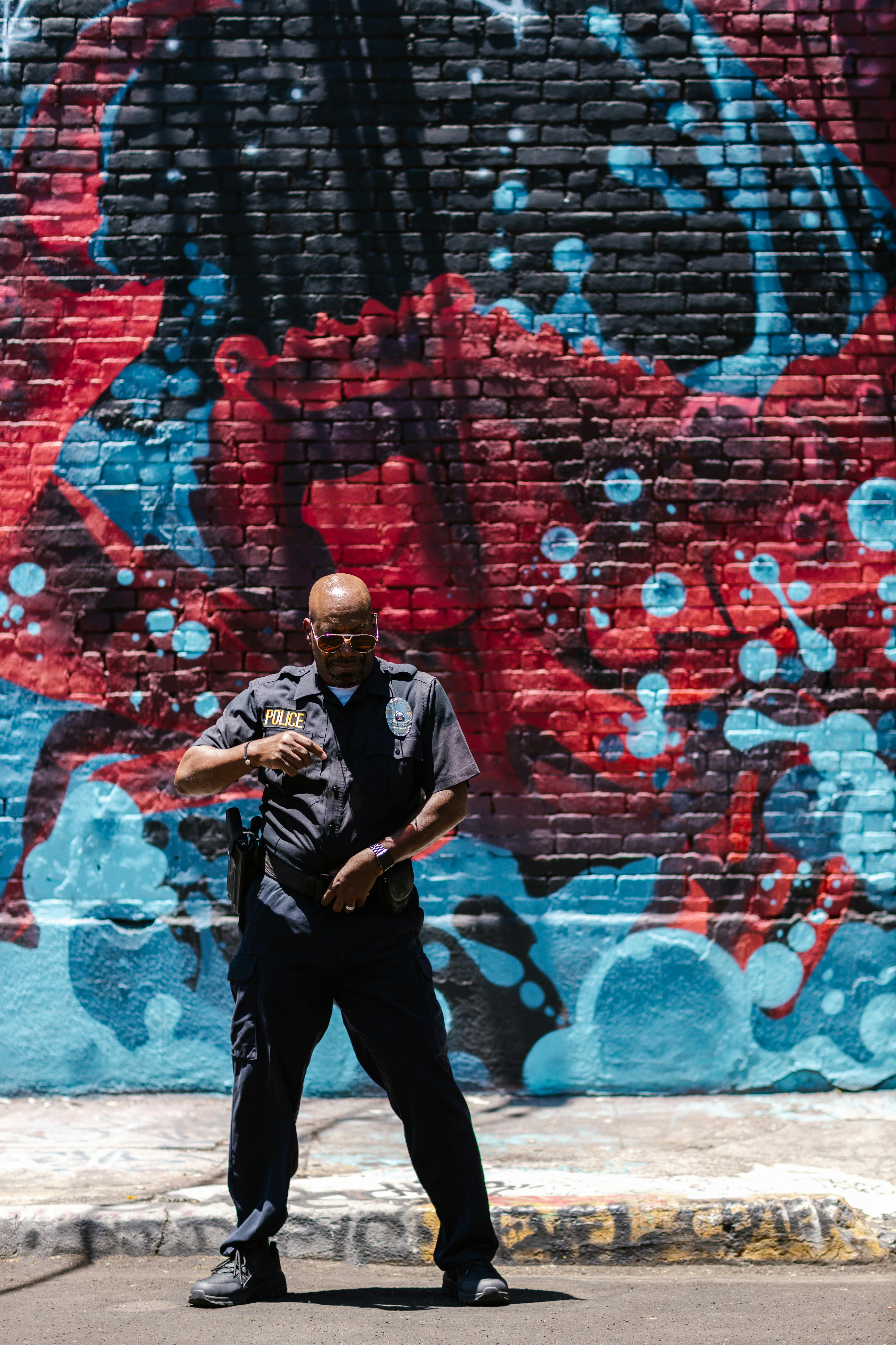 Man and Graffiti on Wall · Free Stock Photo
