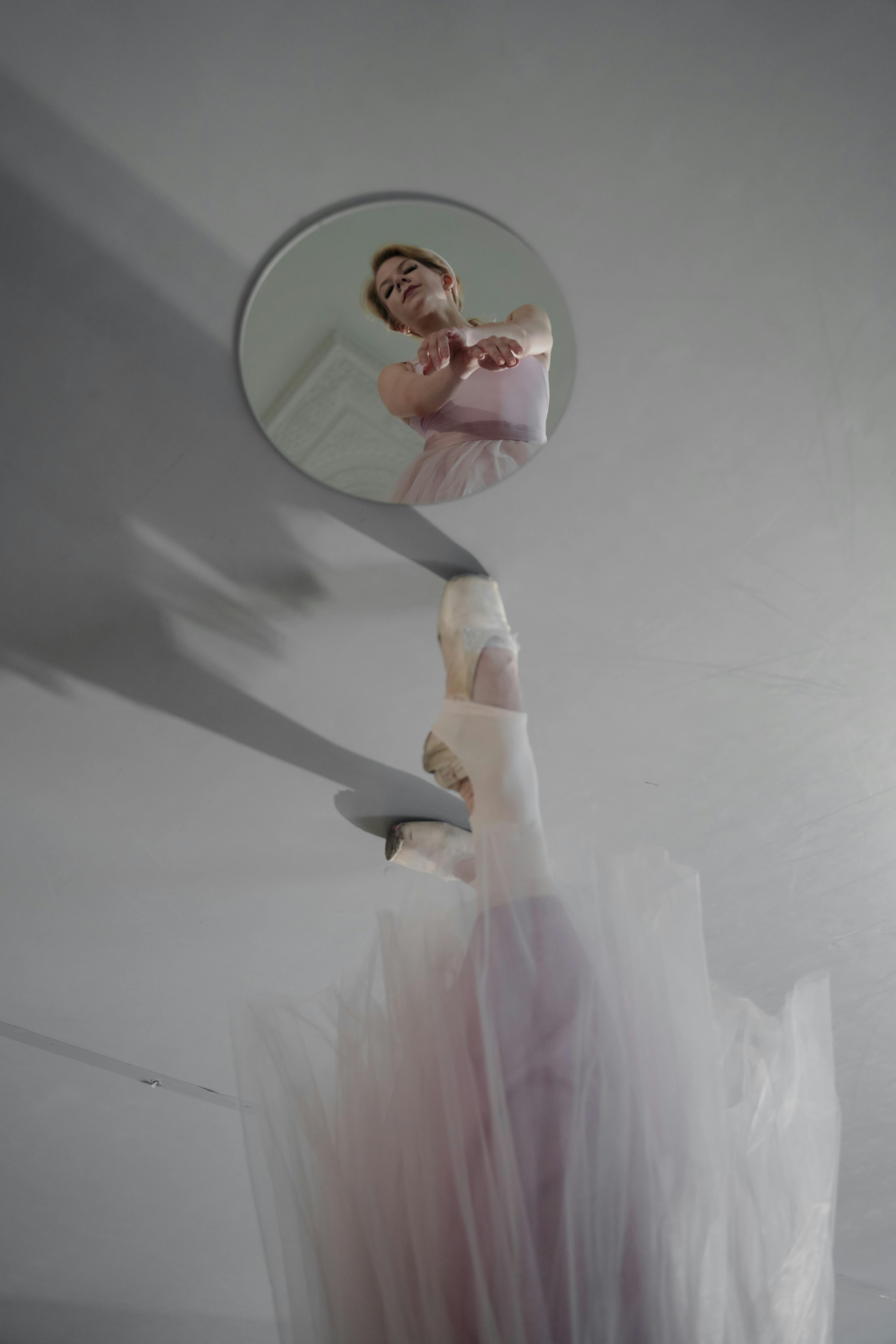 Reflection Of A Woman In The Mirror Dancing Ballet · Free Stock Photo