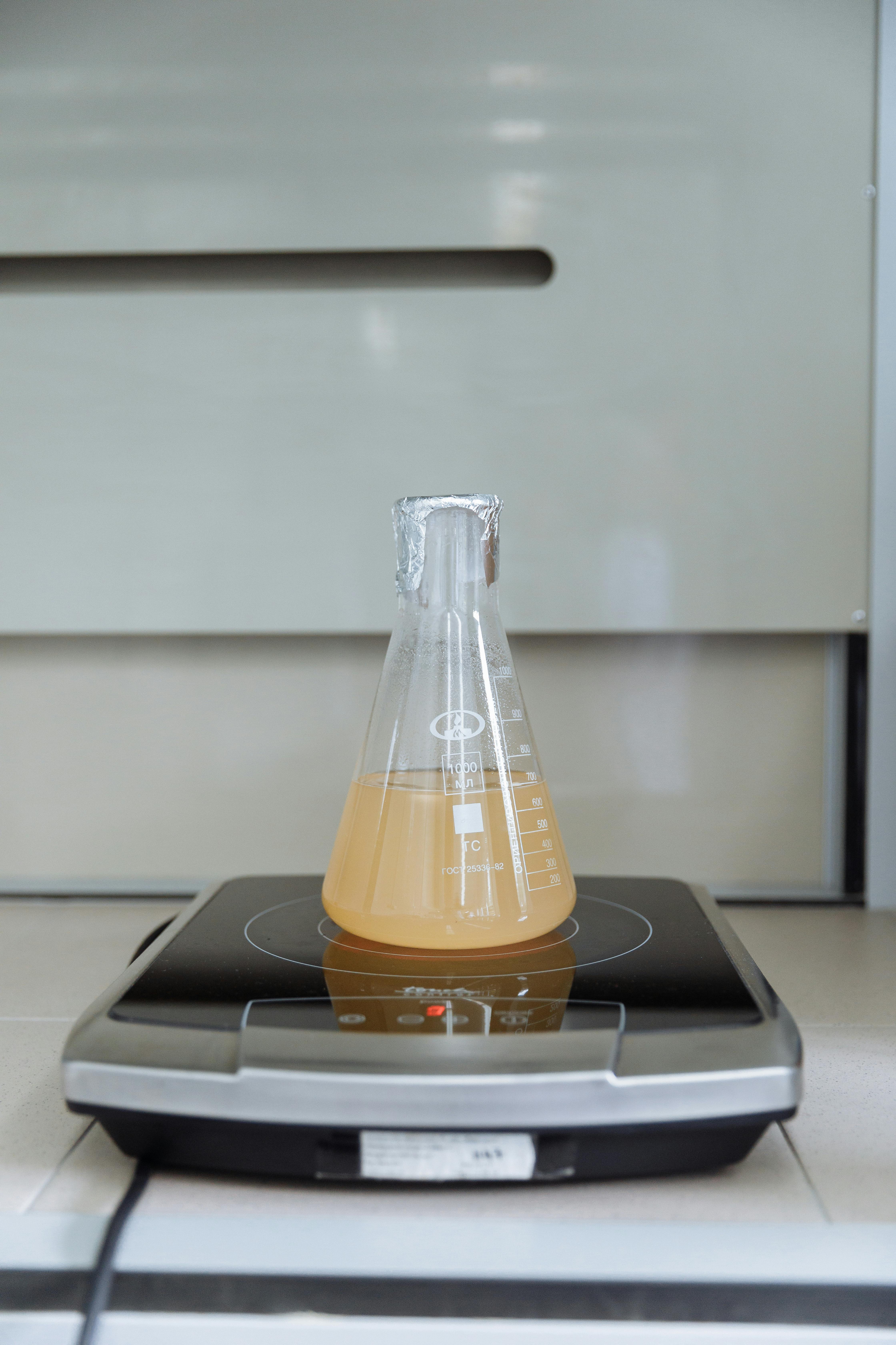 An Erlenmeyer Flask on a Magnetic Stirrer · Free Stock Photo