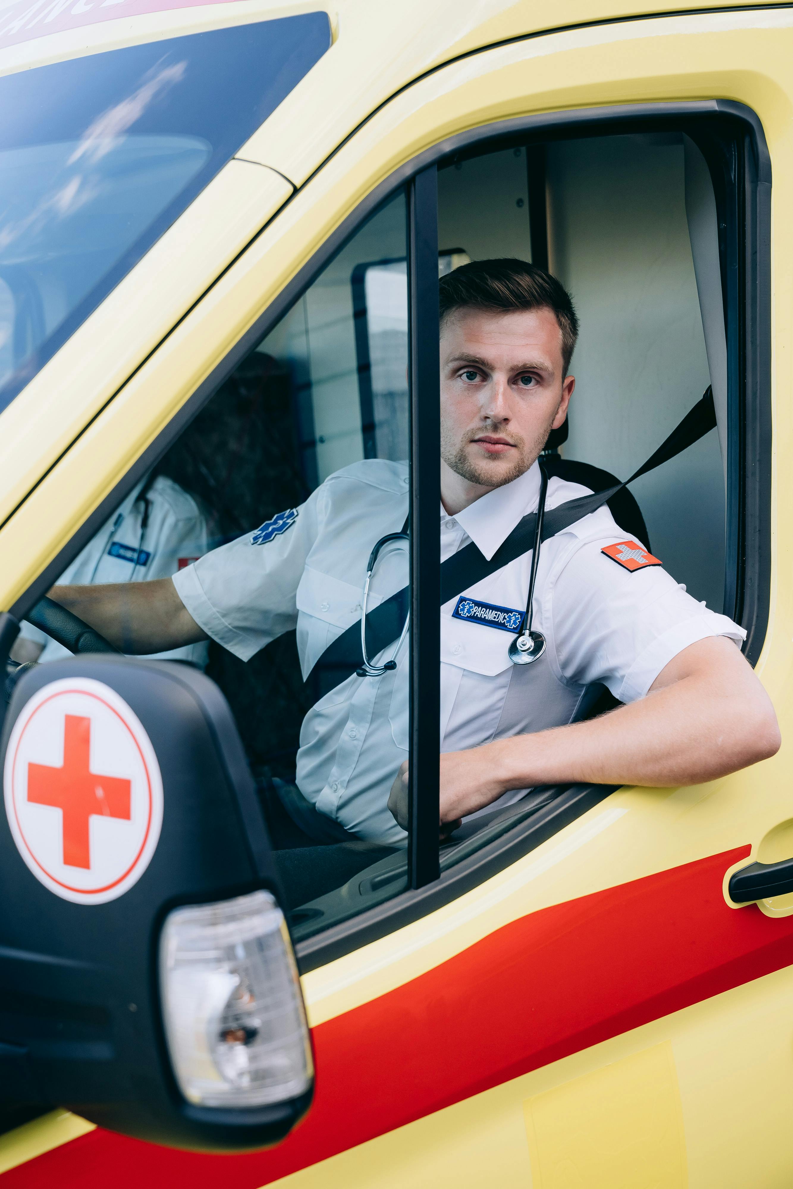 Paramedics Inside An Ambulance · Free Stock Photo