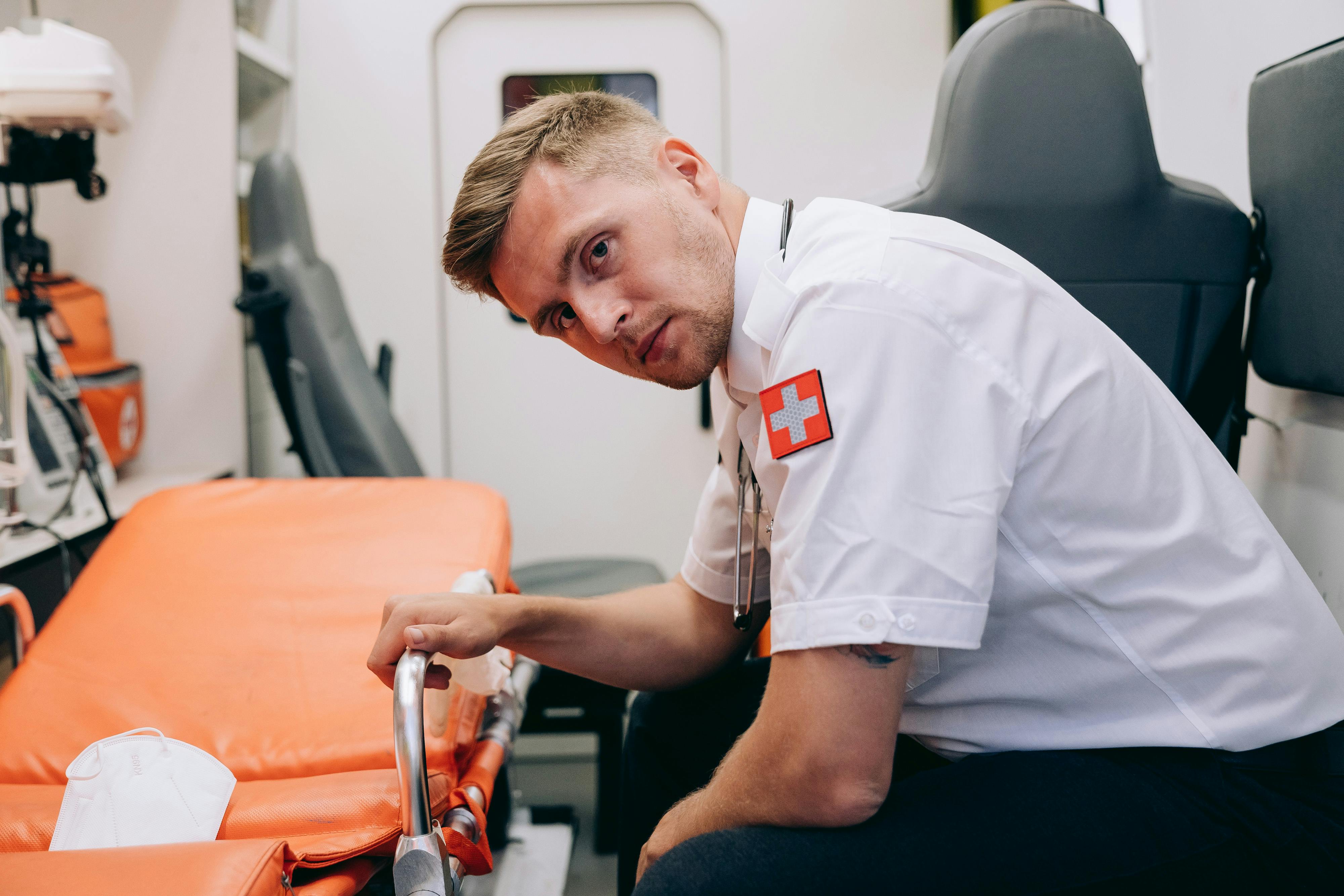 A Paramedic inside an Ambulance · Free Stock Photo