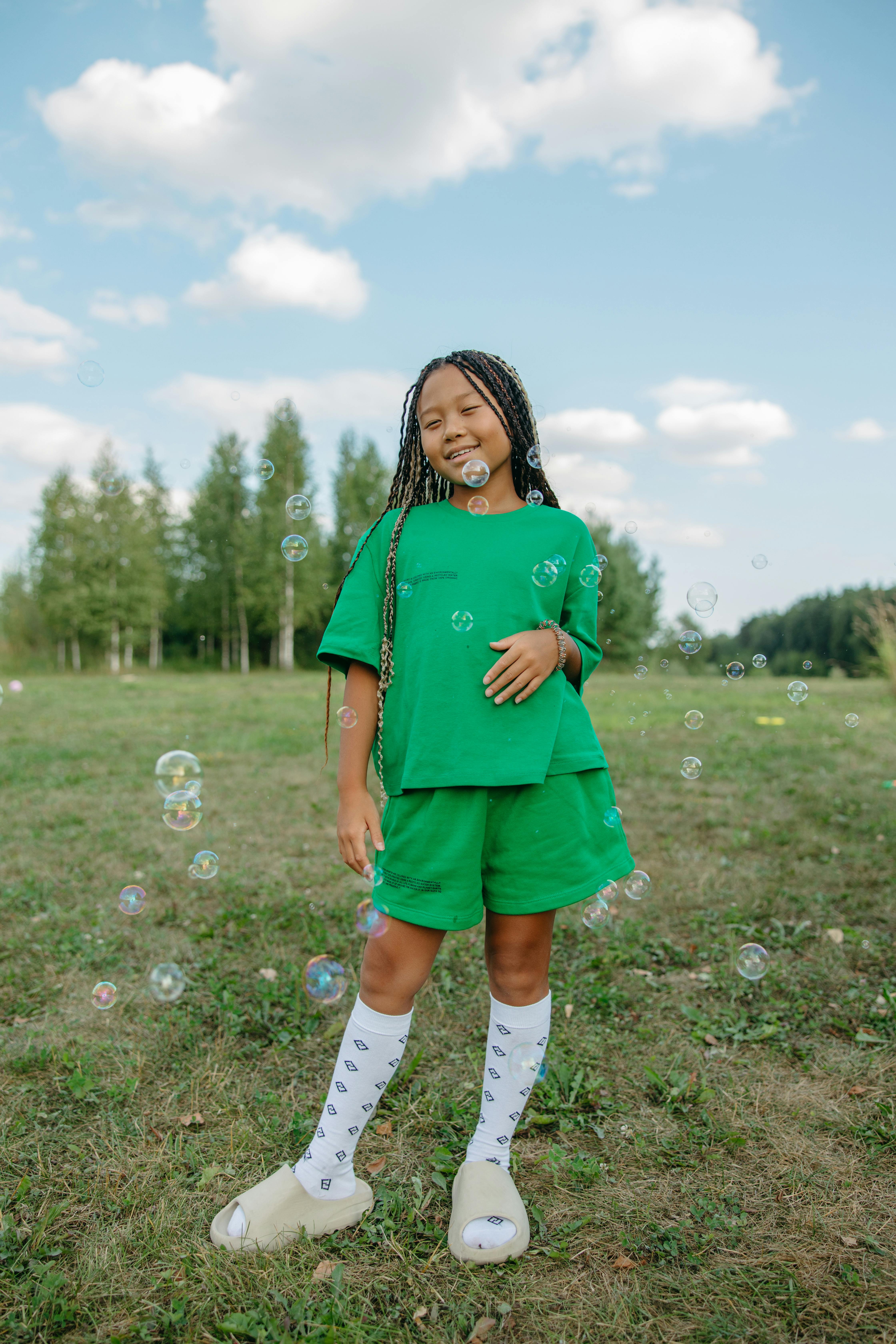 Girl in Green Clothing · Free Stock Photo