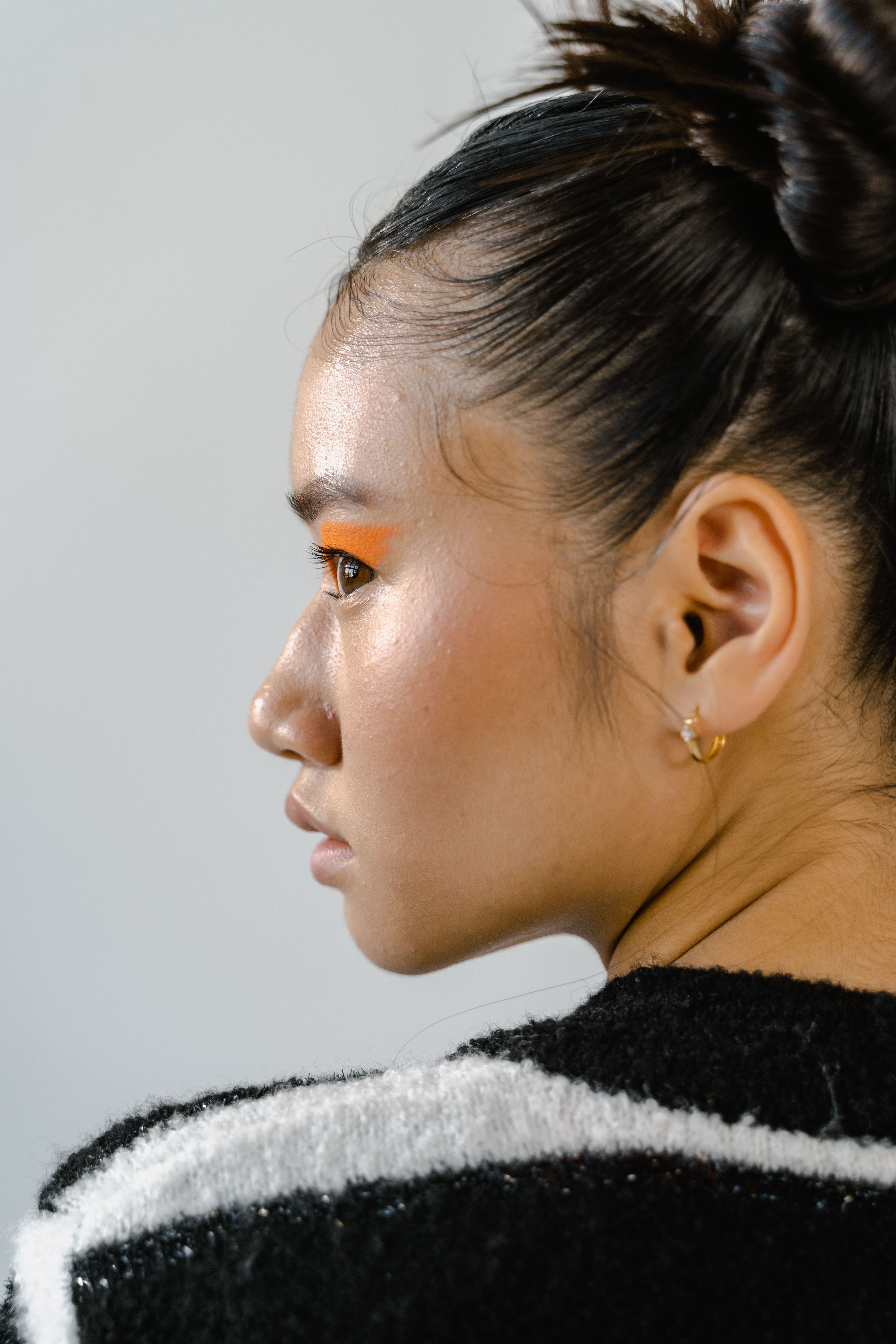 Side Profile of a Woman in Close-up Shot · Free Stock Photo