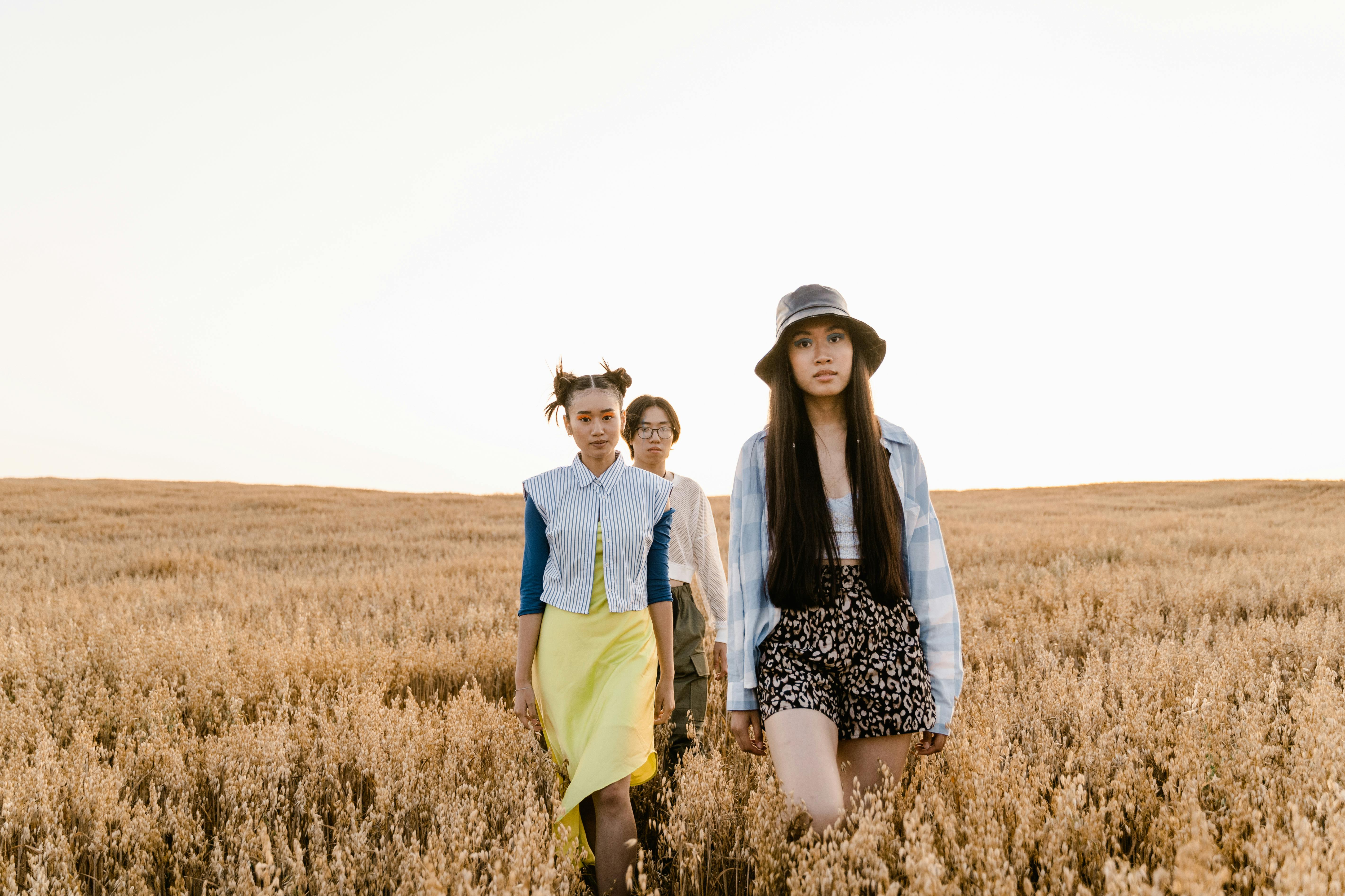 People Standing on Grass Field · Free Stock Photo