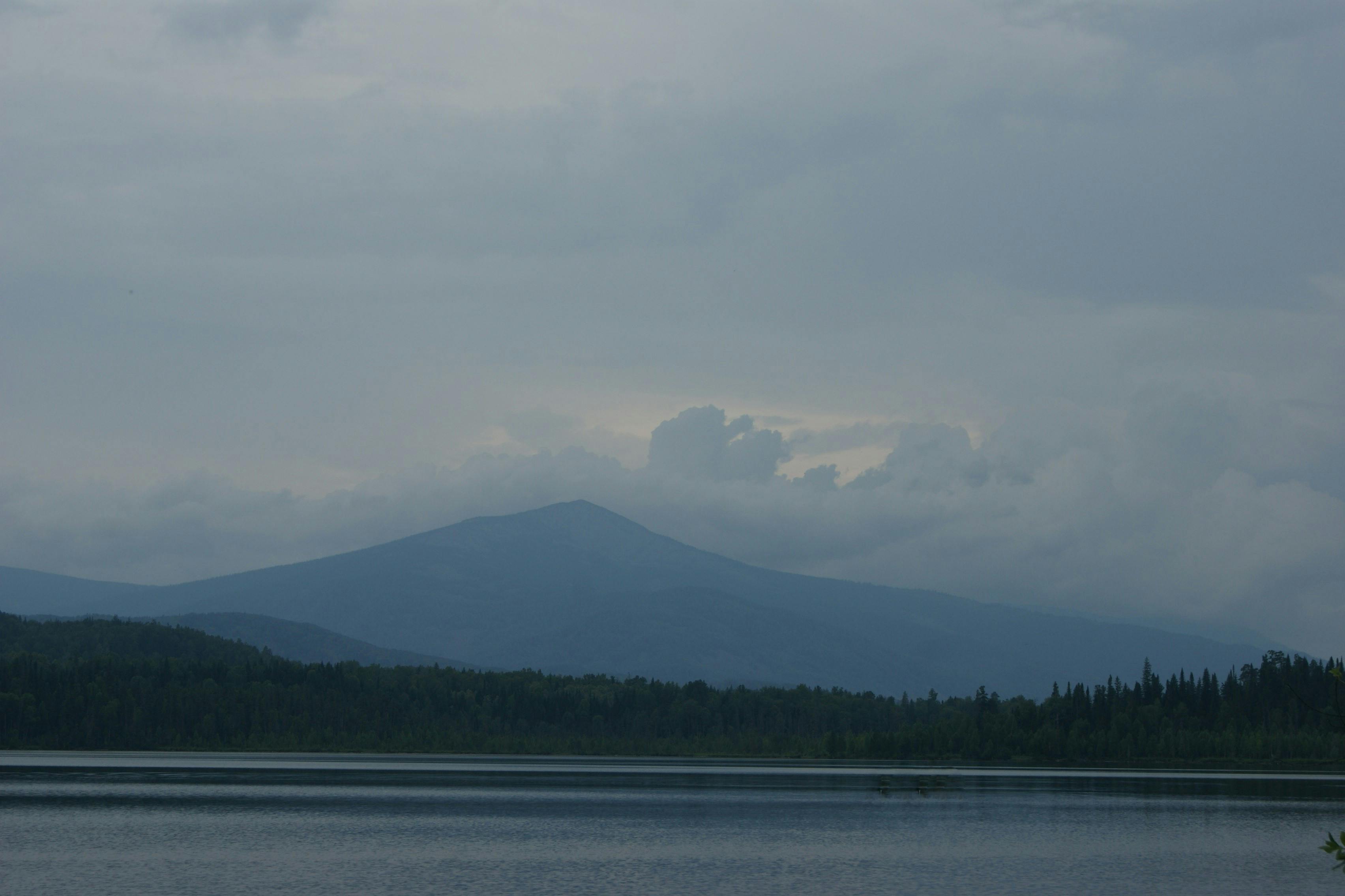 Landscape of a Lake, Forest and Mountains in Distance · Free Stock Photo