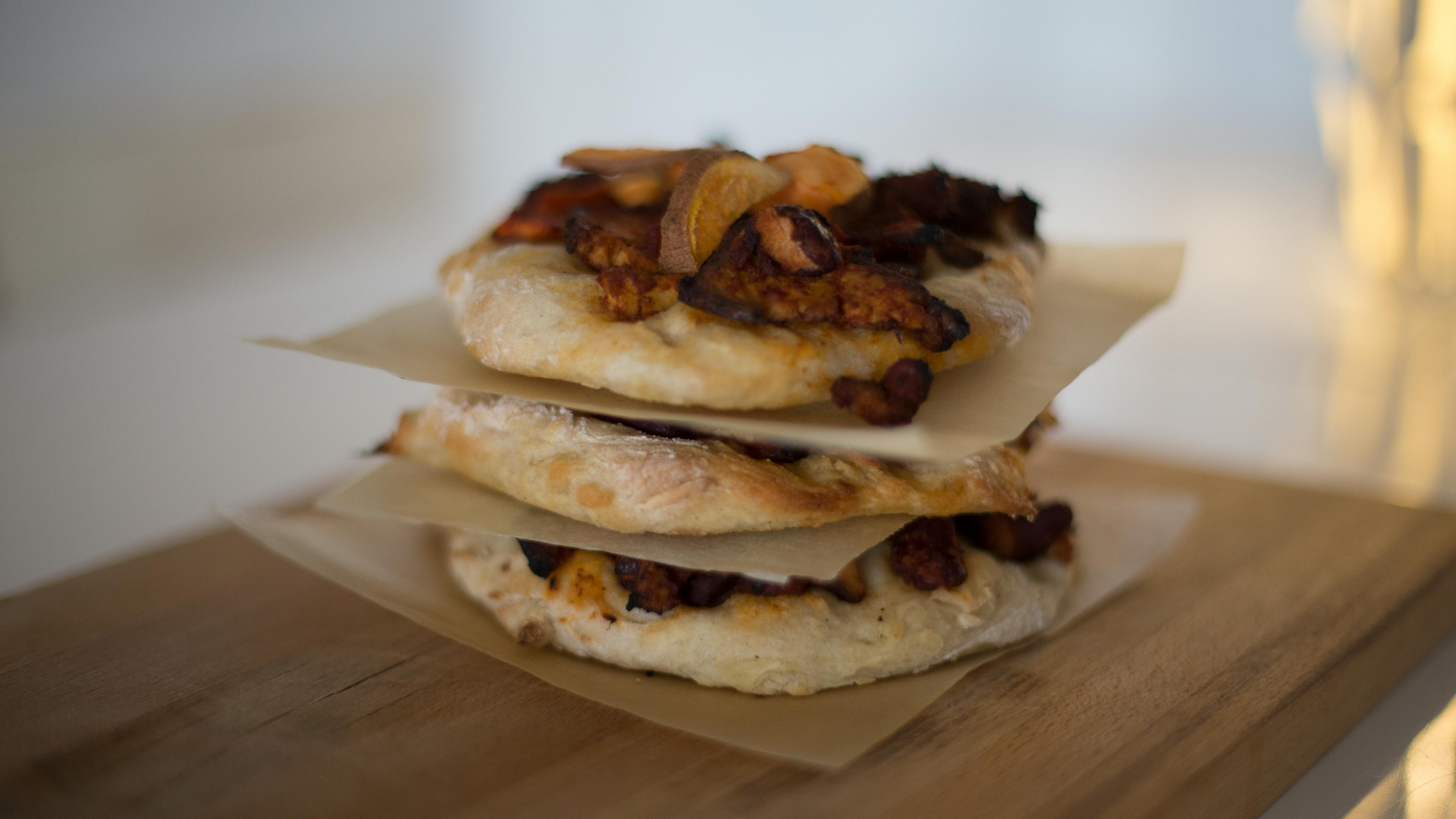 Stack of Pies on Brown Wooden Panel in Tilt Shift Lens · Free Stock Photo