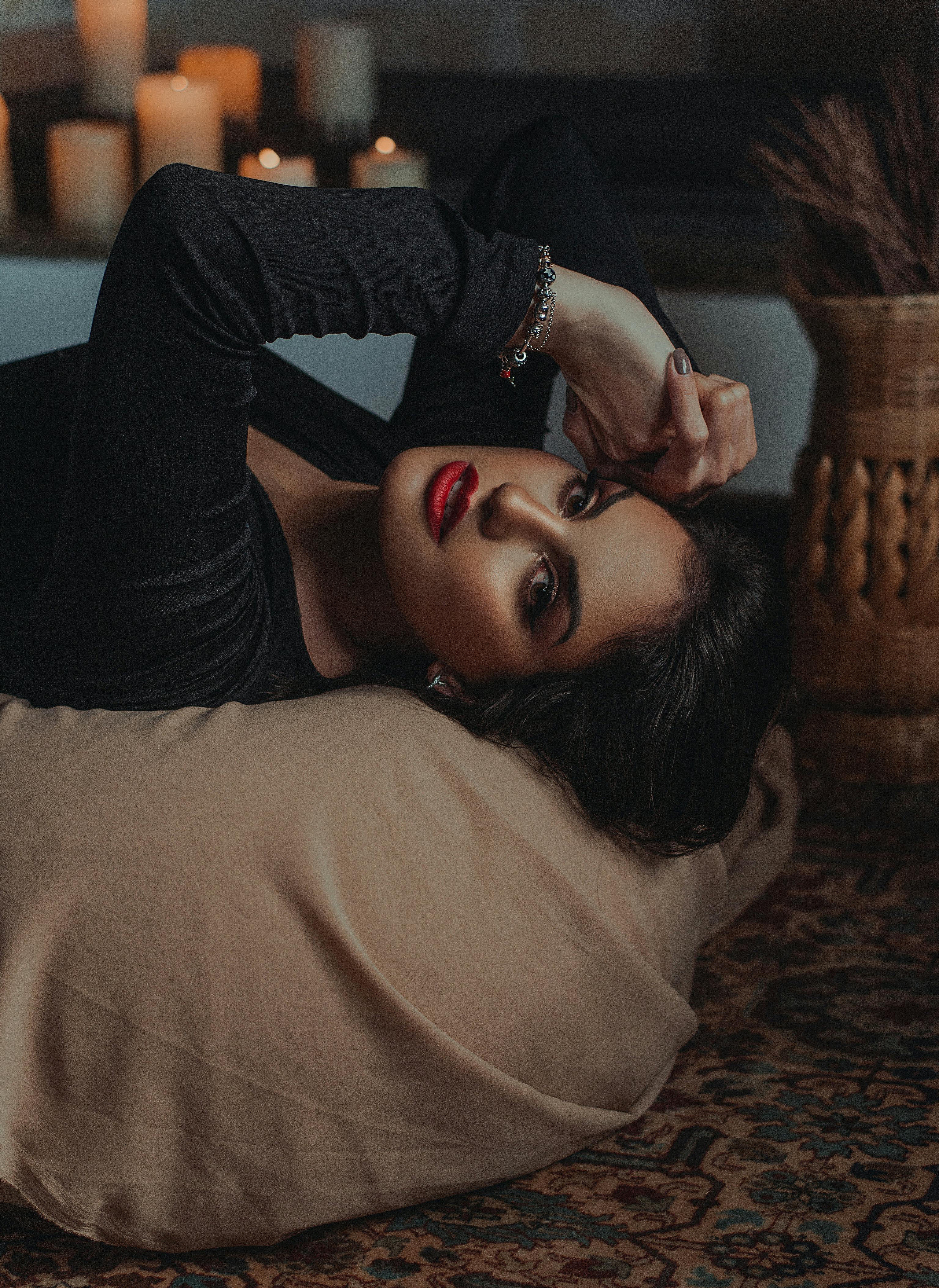 Woman Posing on Sofa · Free Stock Photo