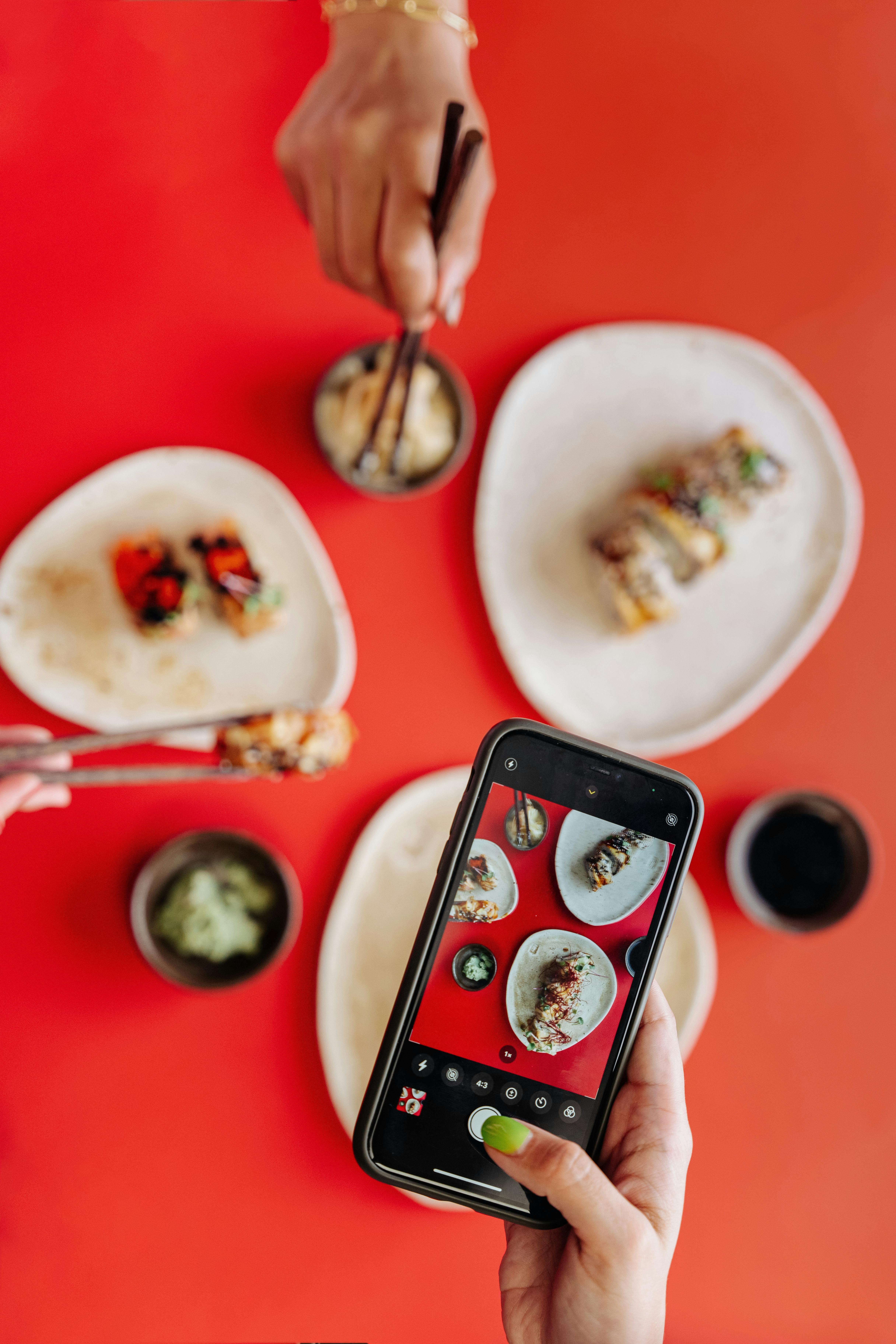 Woman's Hand Taking Picture of the Food · Free Stock Photo