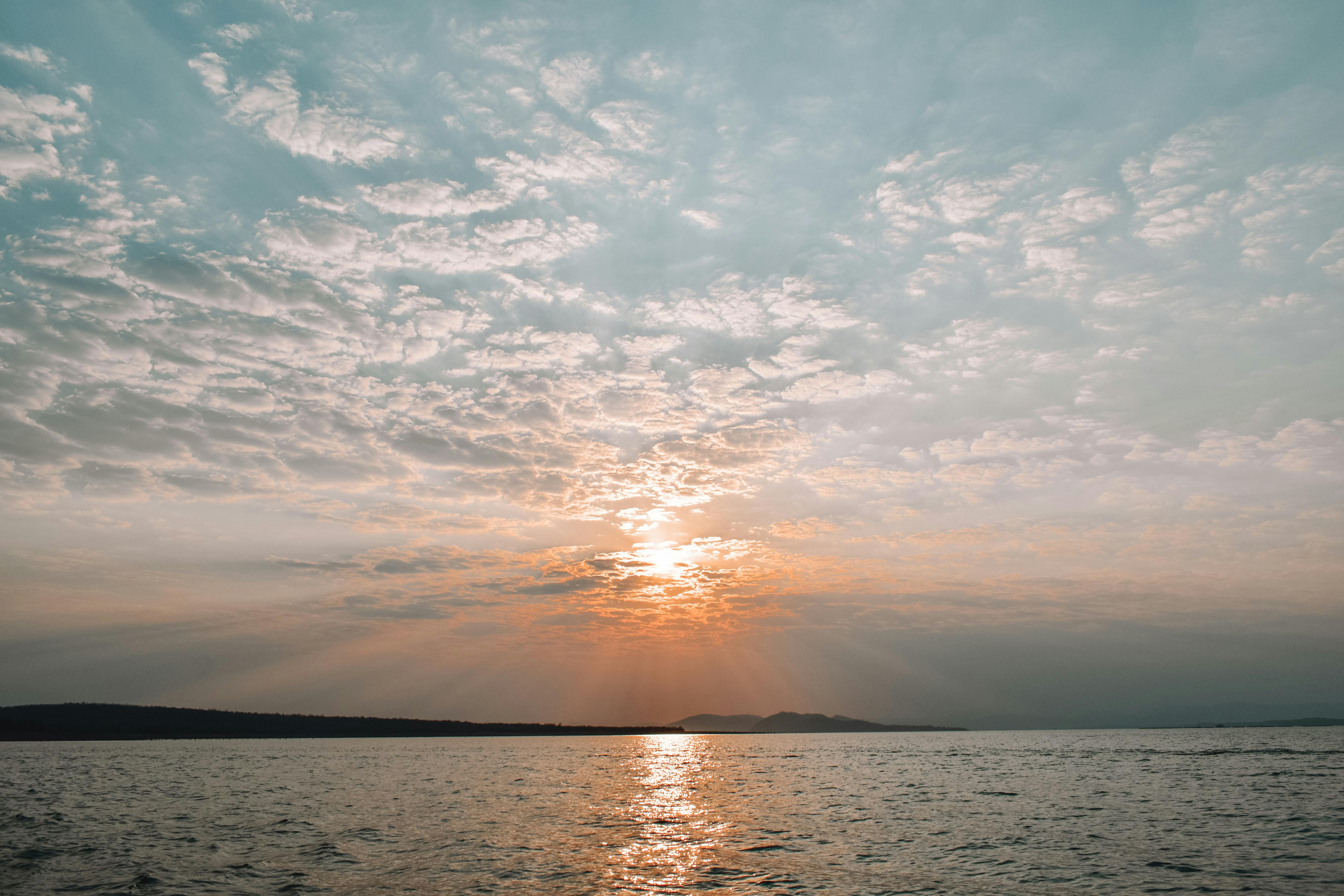 Gray and Yellow Cloudy Sky during Sunset \ · Free Stock Photo