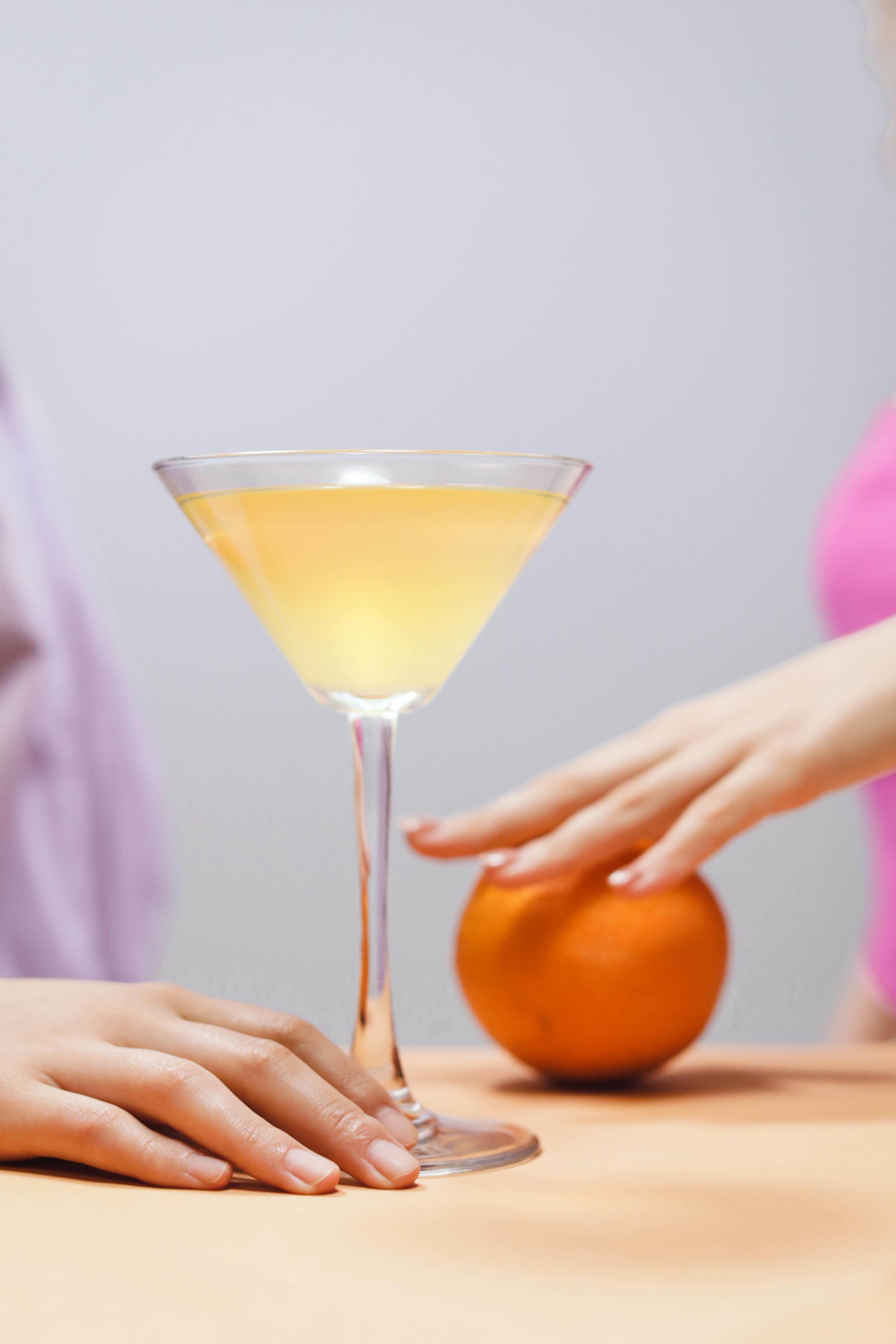 Person Holding a Cocktail · Free Stock Photo