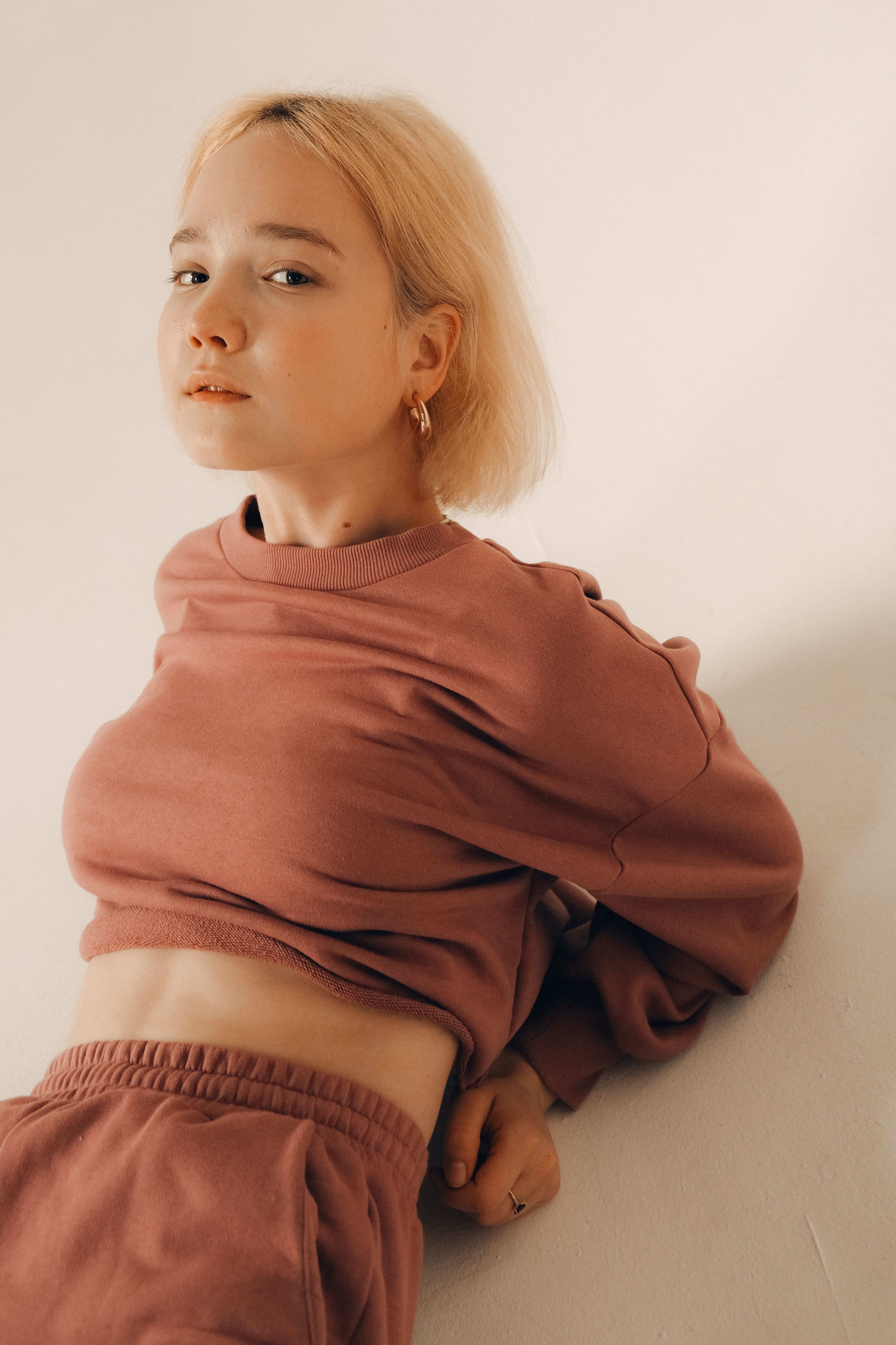 Face of Model in Gap between Ladder Steps · Free Stock Photo