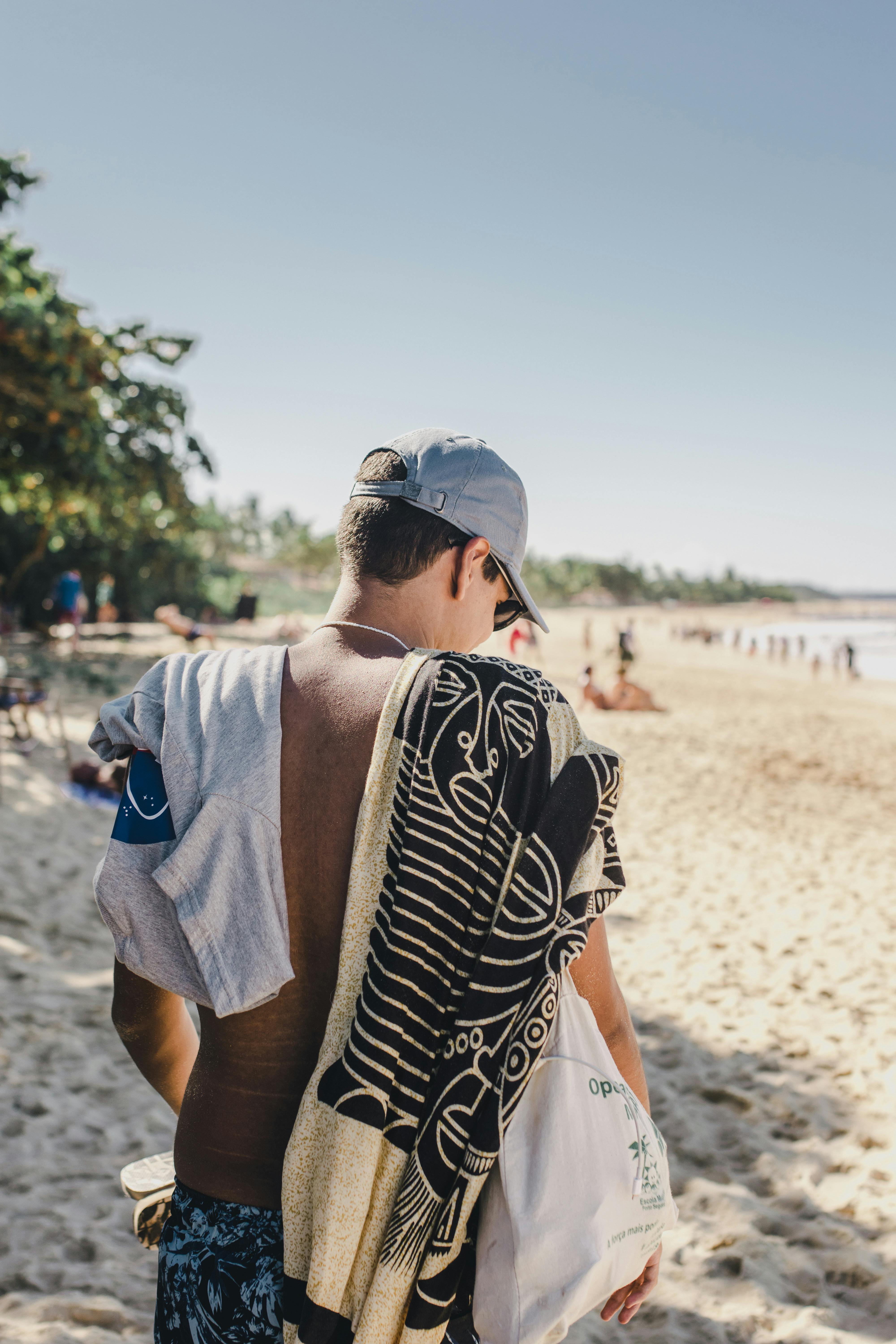 Back View of a Man on the Beach · Free Stock Photo