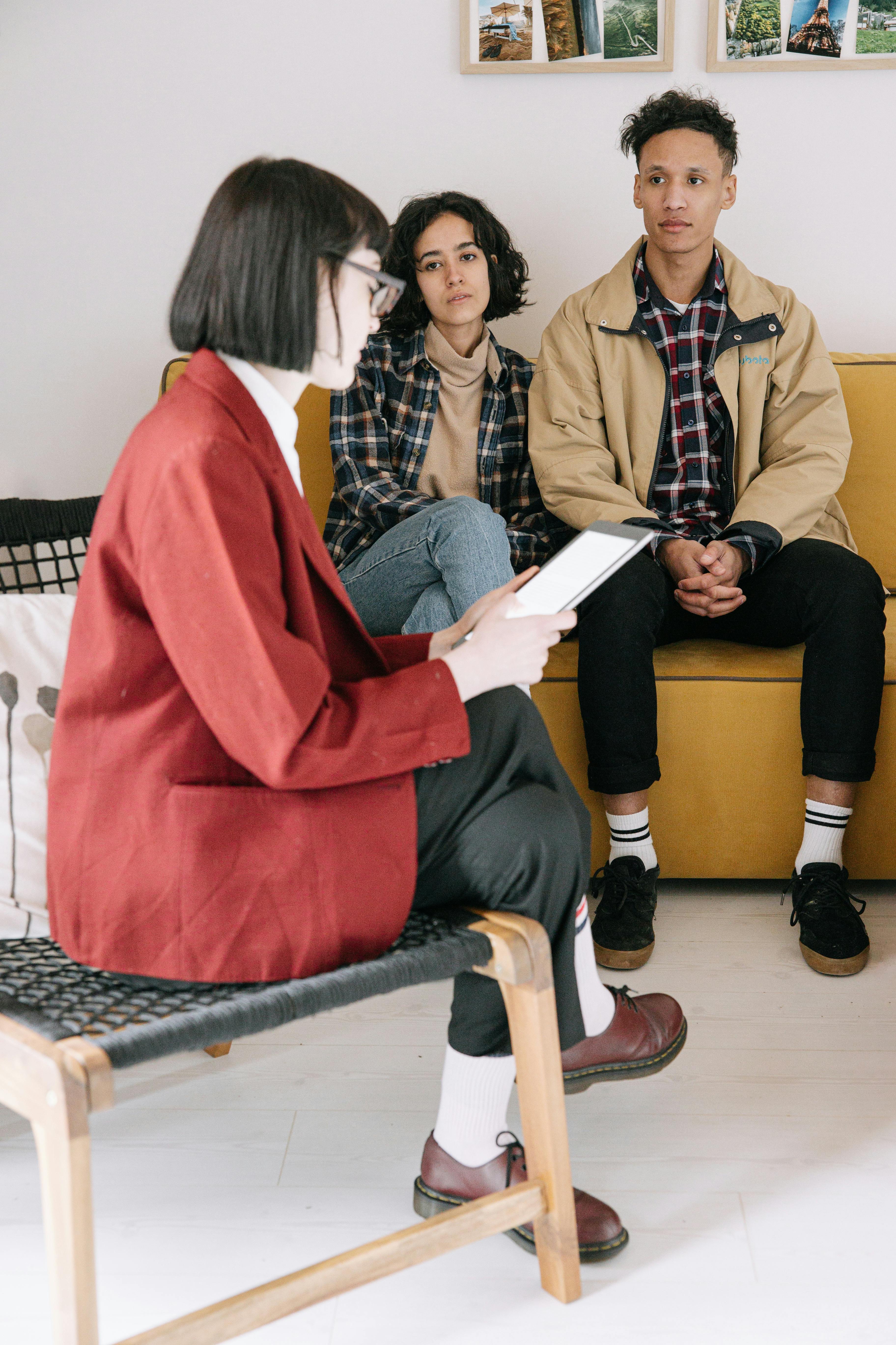 A Formal Meeting of Three People · Free Stock Photo