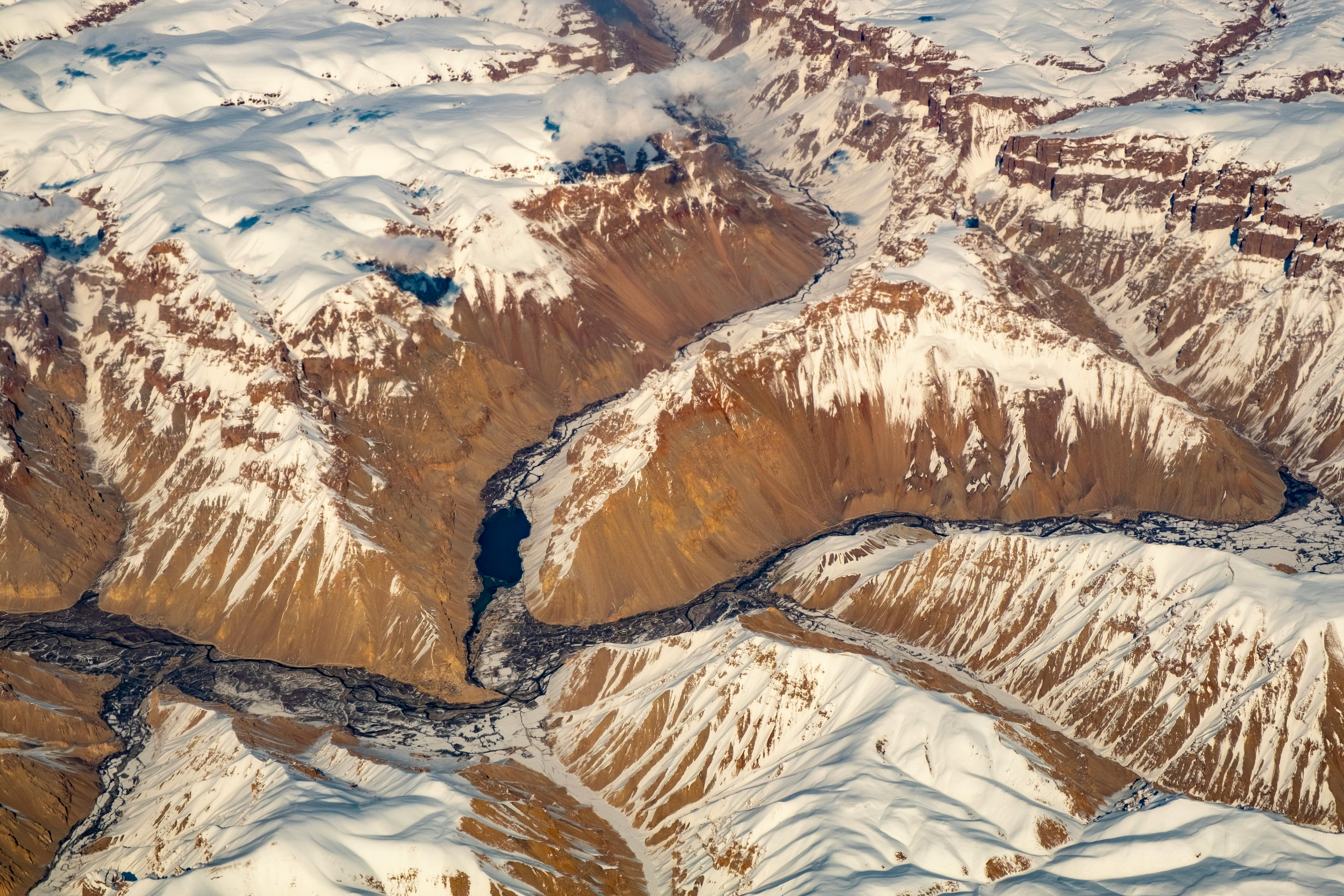 Aerial View of a Canyon Covered in Snow · Free Stock Photo