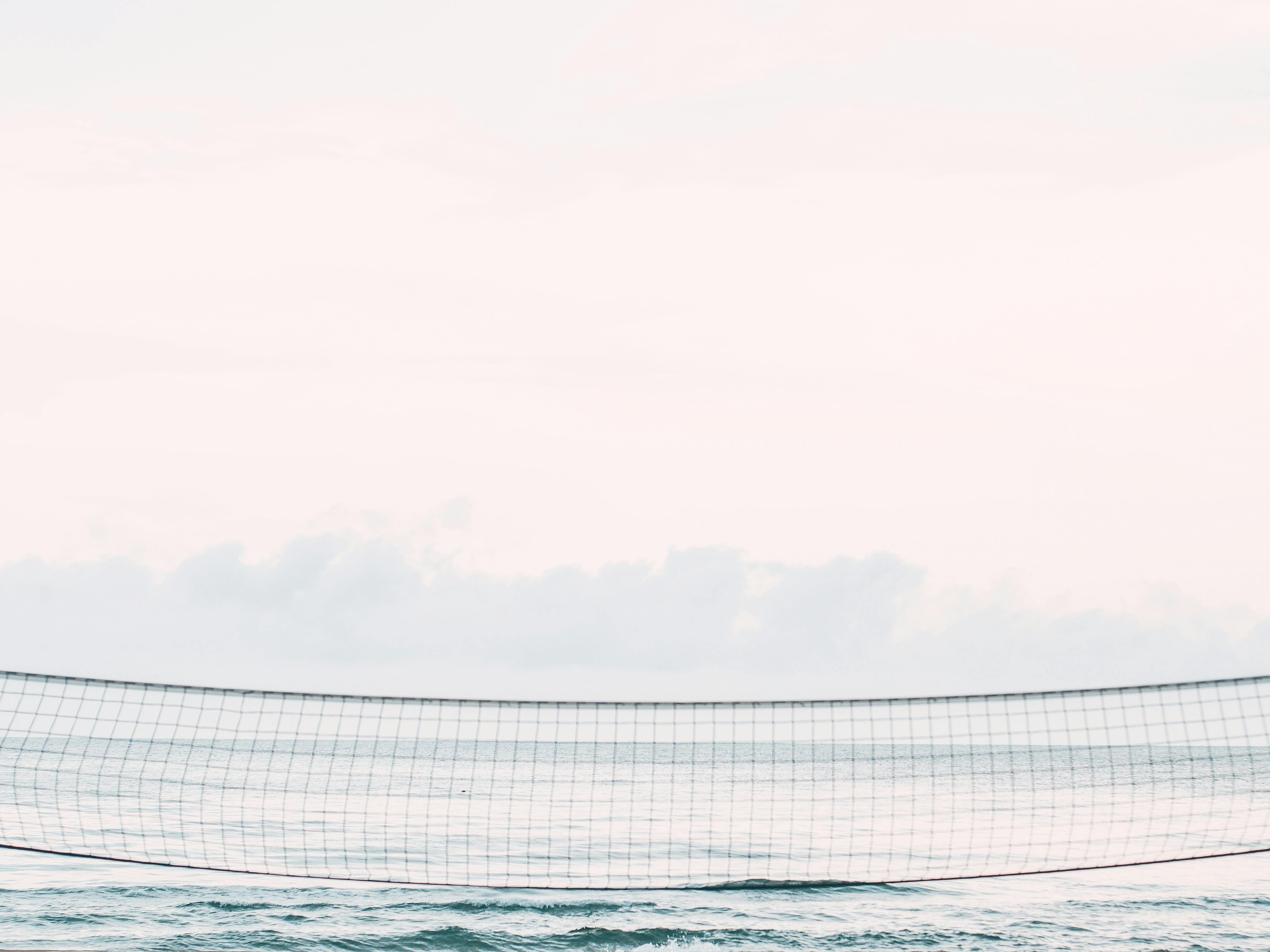 Volleyball Net Hanging Above Water · Free Stock Photo