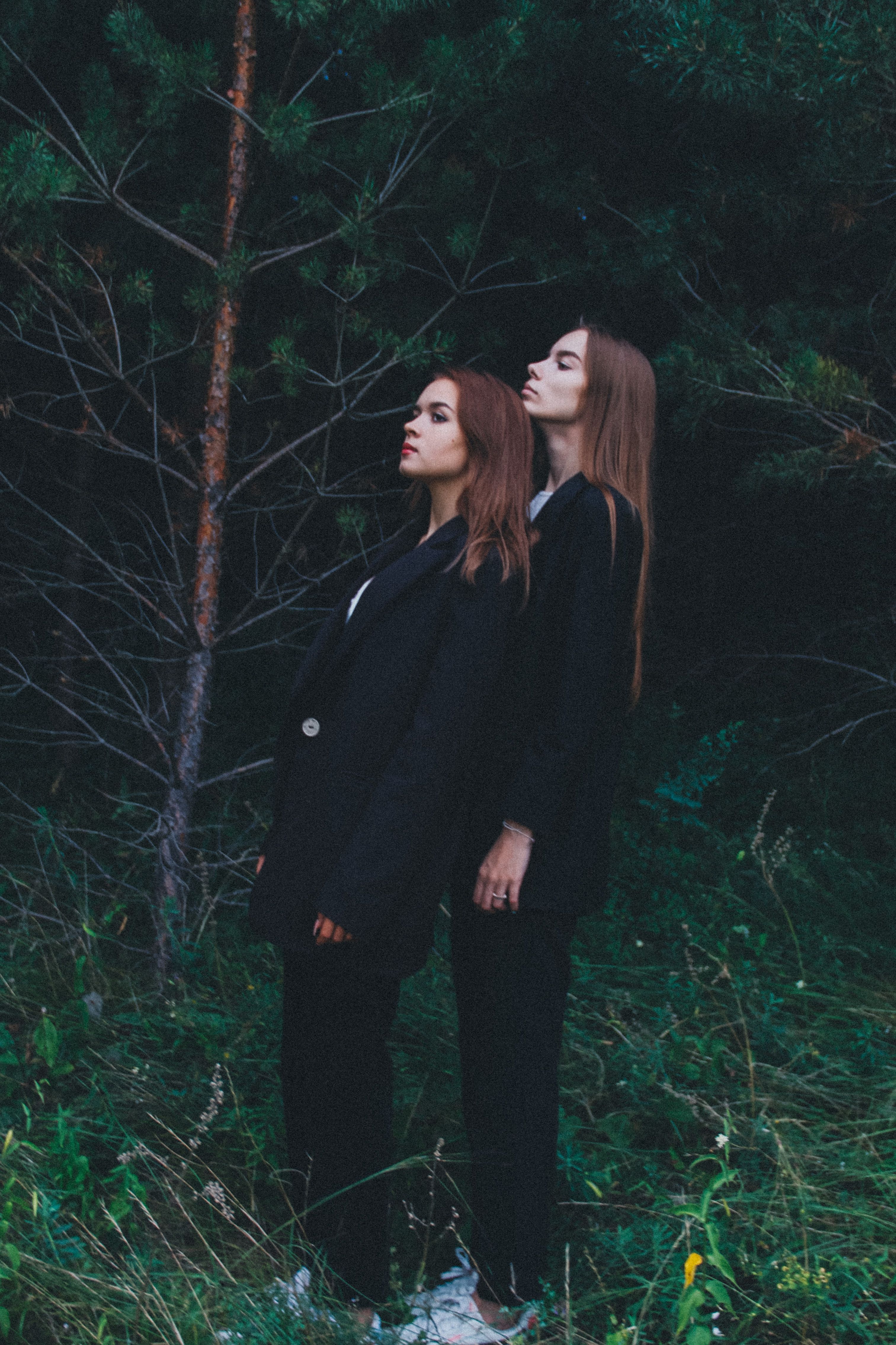 Women in Suits Posing in Forest · Free Stock Photo