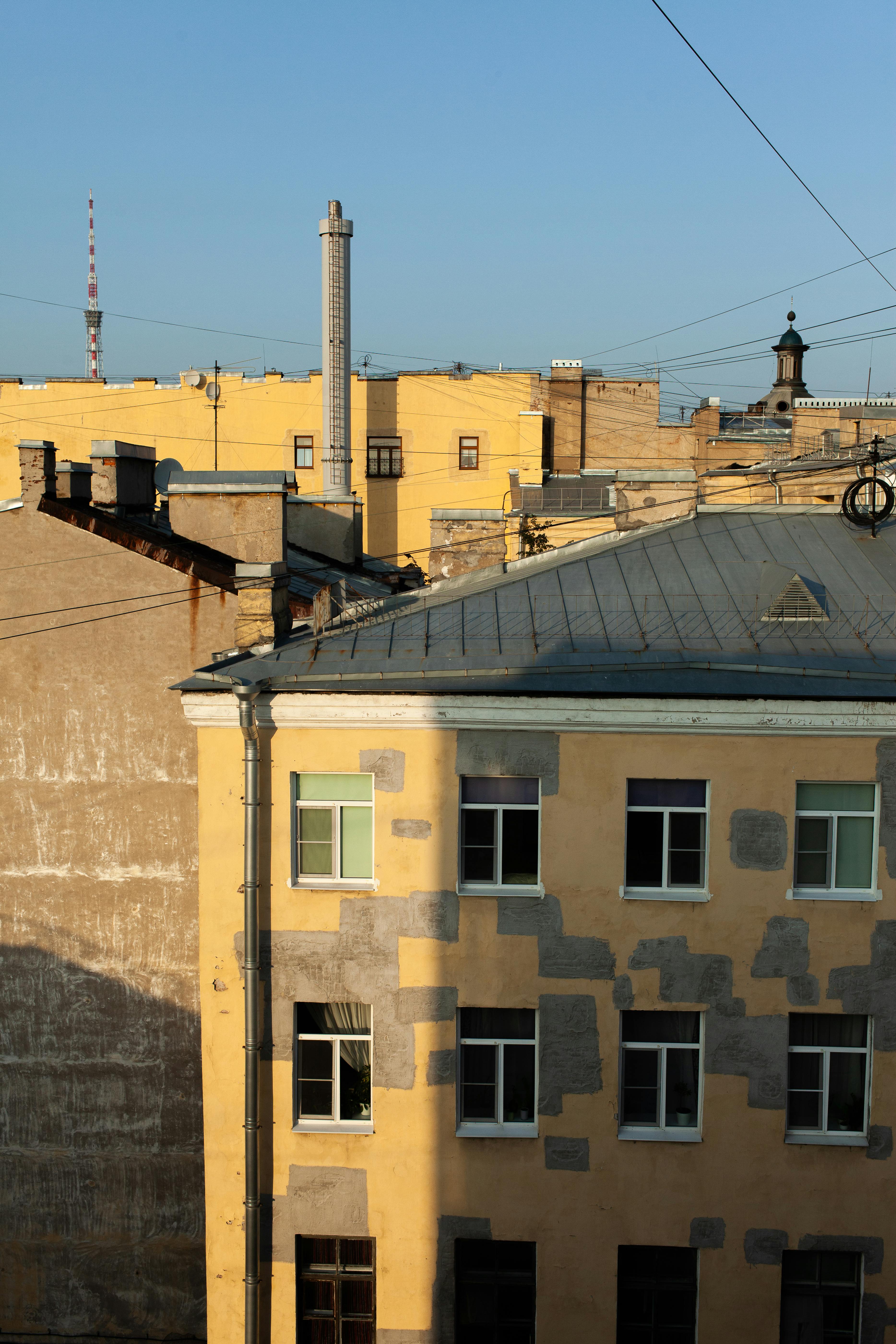 View on Roofs of Yellow Buildings · Free Stock Photo