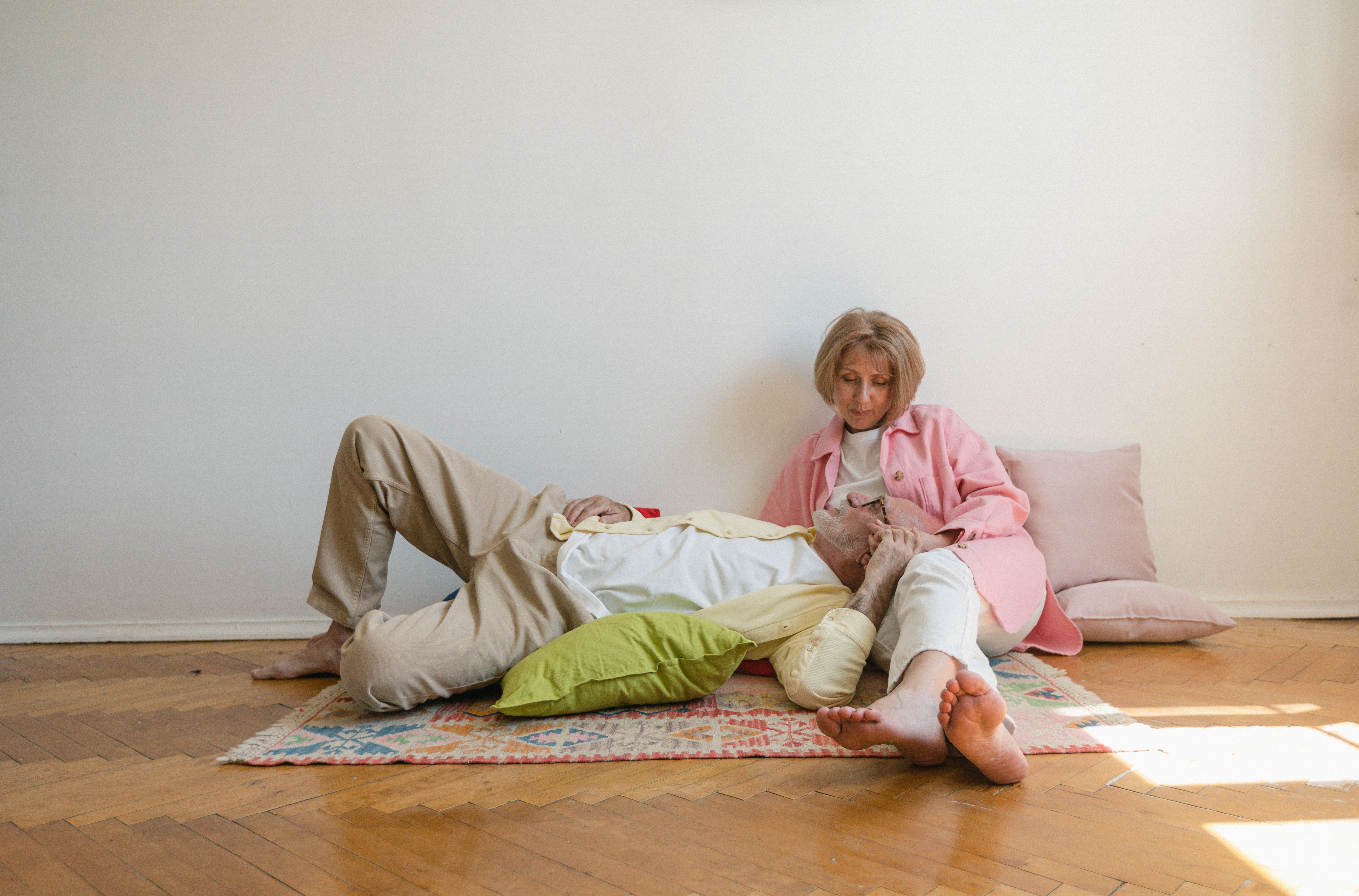 A Man Lying Down on a Woman's Lap · Free Stock Photo